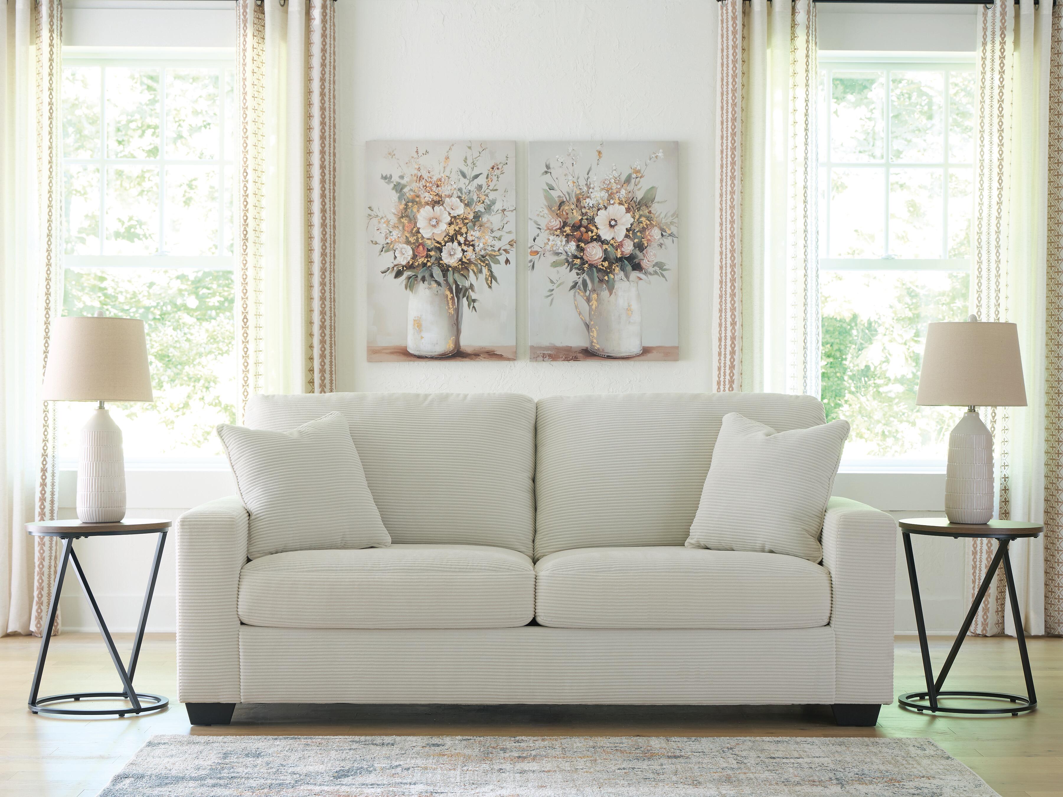 Click here for Amesley Sofa  Ivory prices