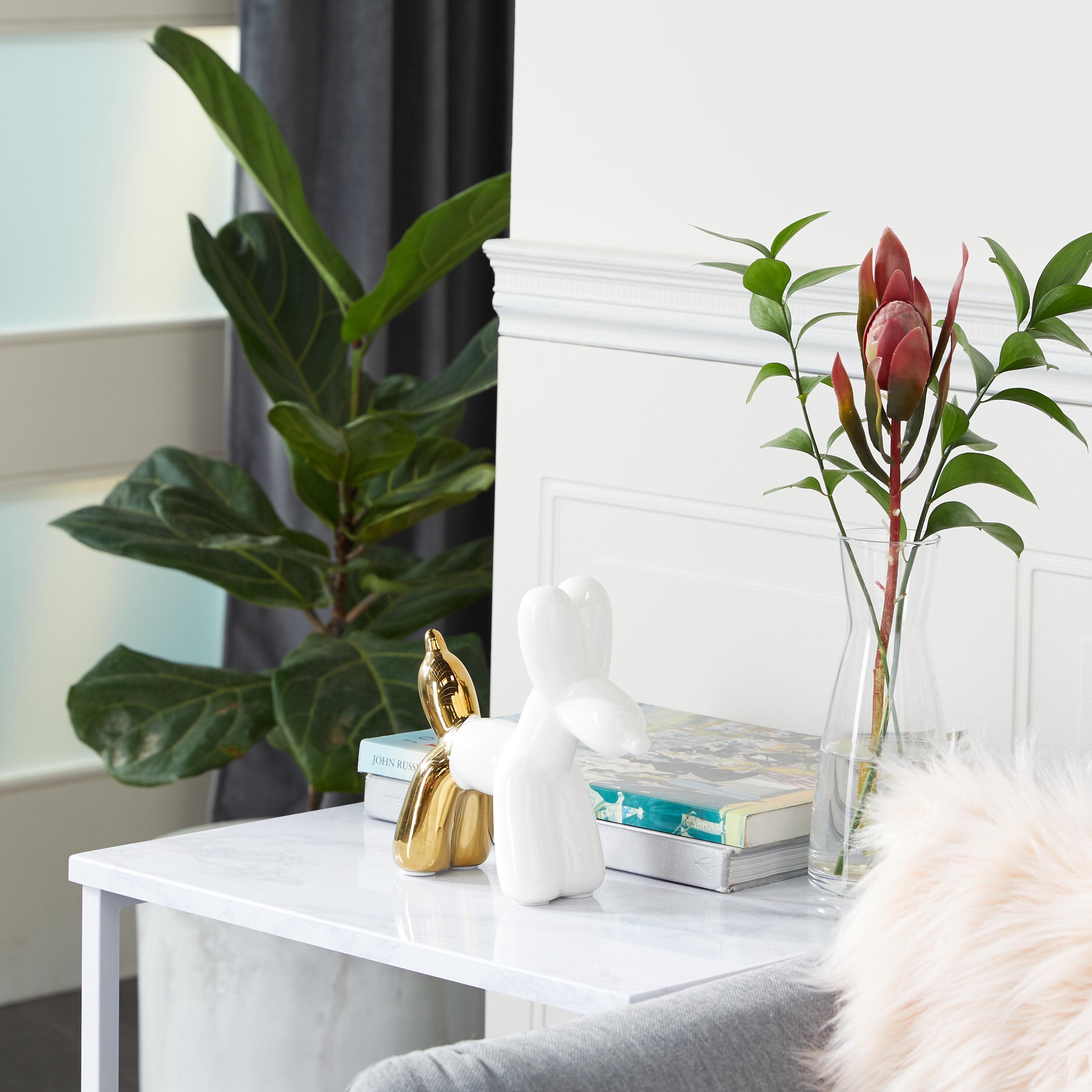 Click here for CosmoLiving by Cosmopolitan Dog Balloon Sculpture... prices