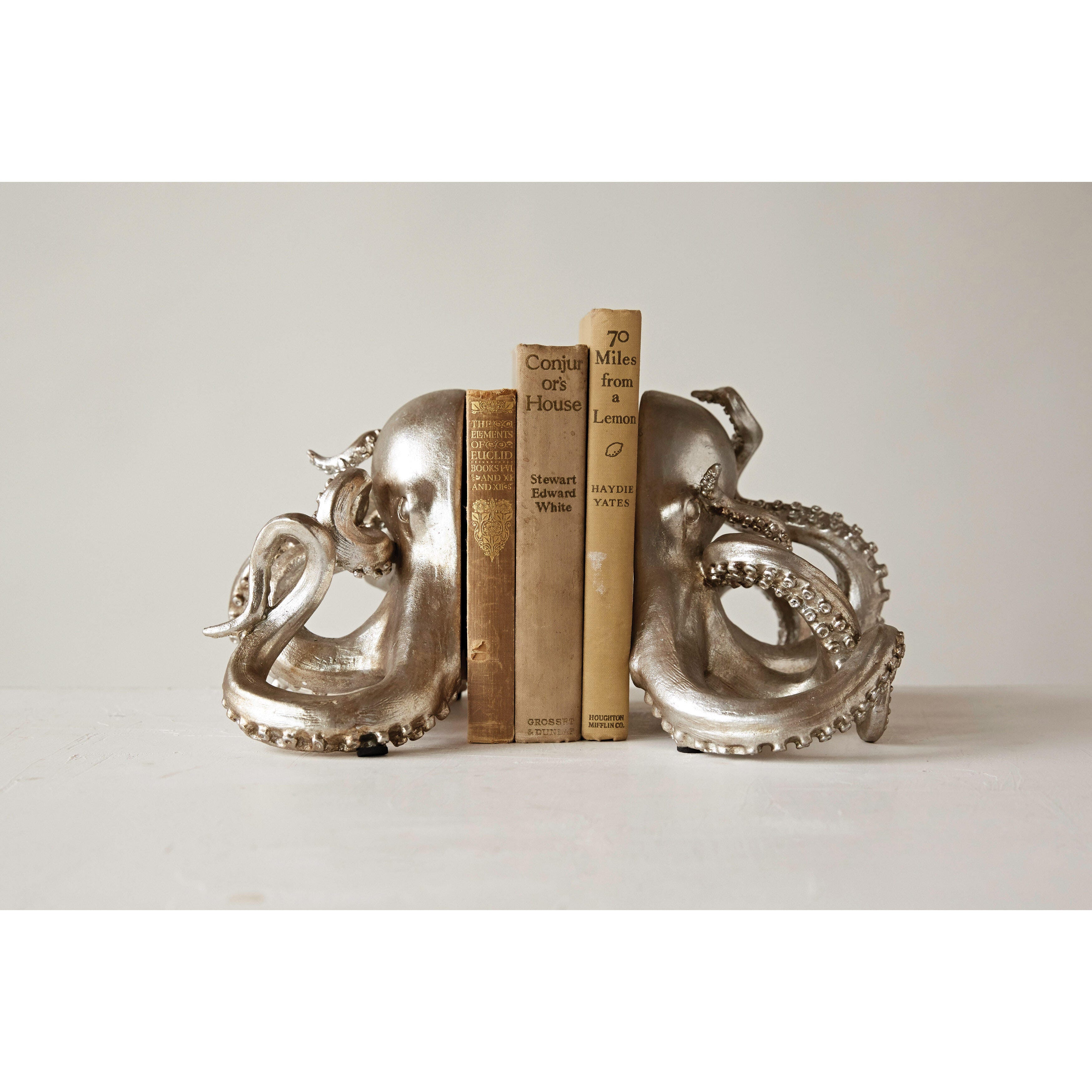 Click here for Storied Home Octopus Bookends (Set of 2)  Silver prices