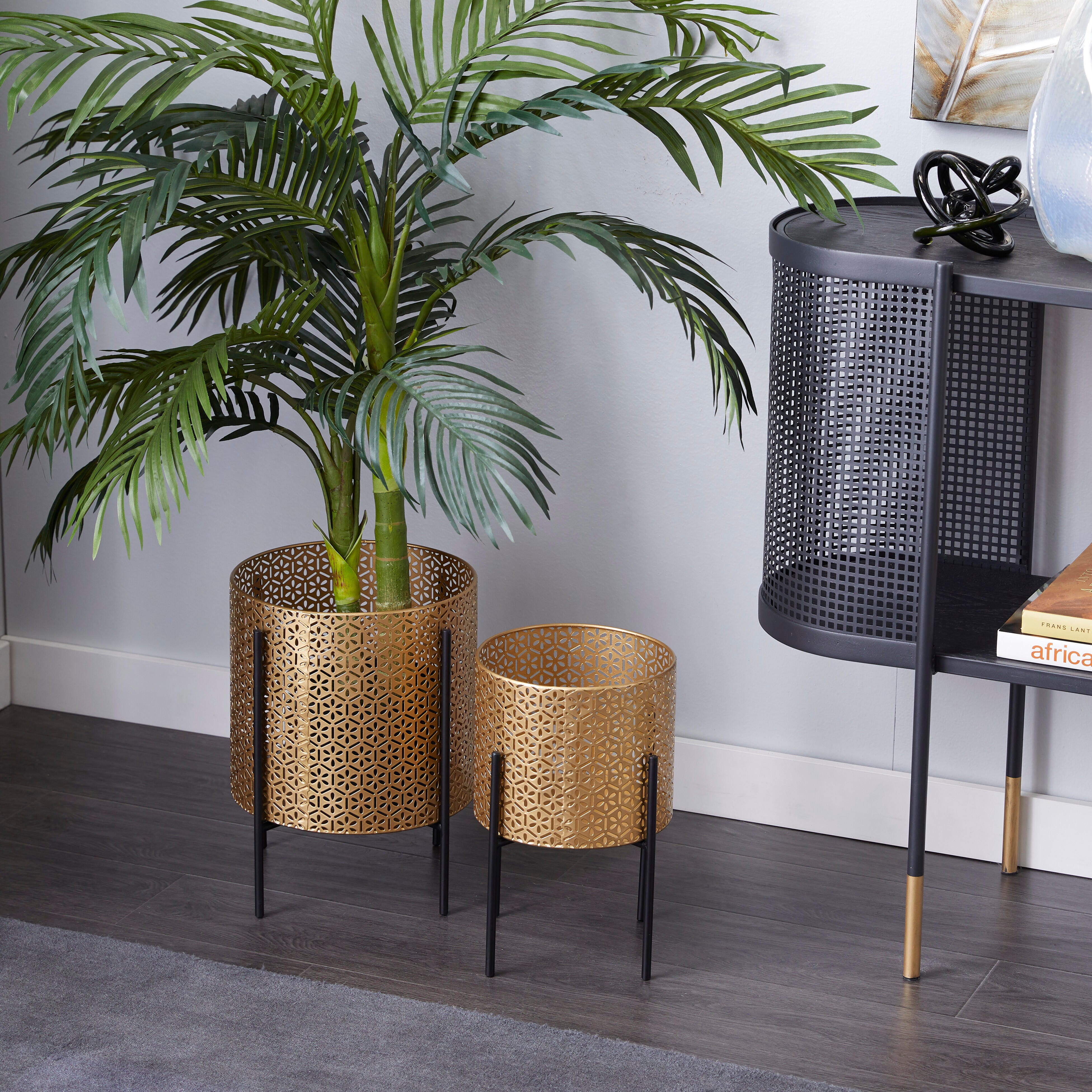 Click here for Cosmopolitan Indoor/Outdoor Cutout Planter (Set of... prices