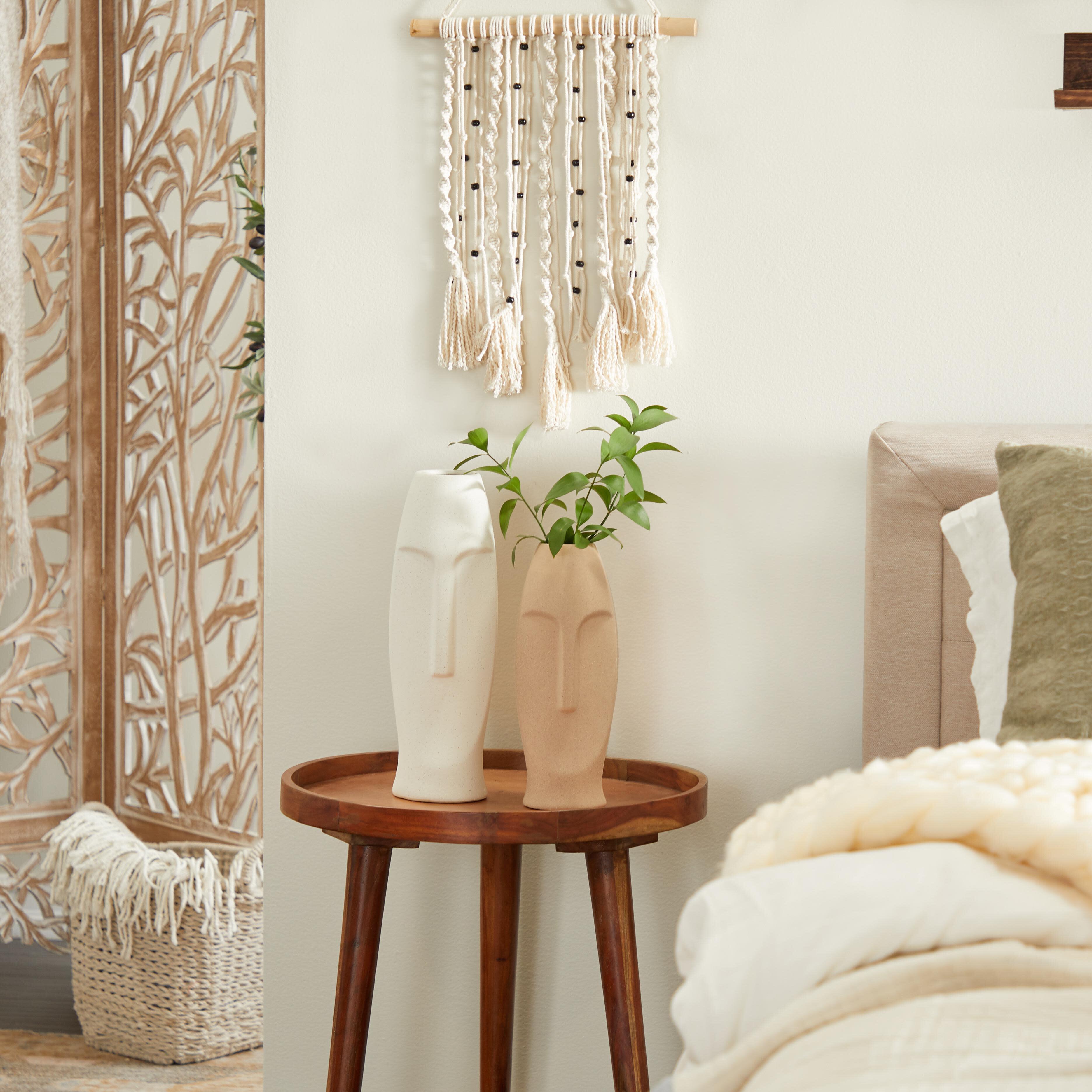 Click here for Bayberry Lane Easter Island Head Vase (Set of 2)... prices