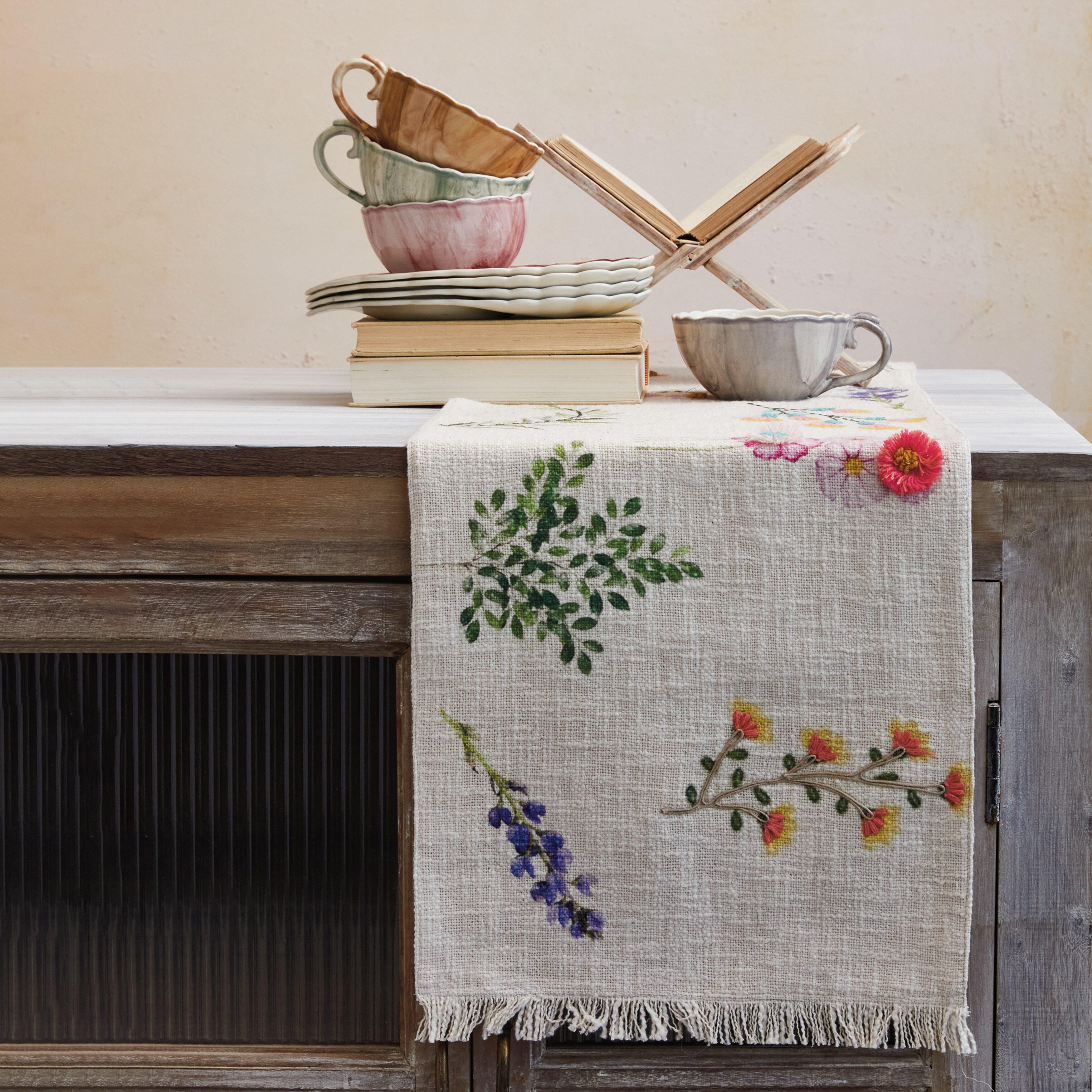 Click here for Storied Home Slub Printed Table Runner with Flower... prices