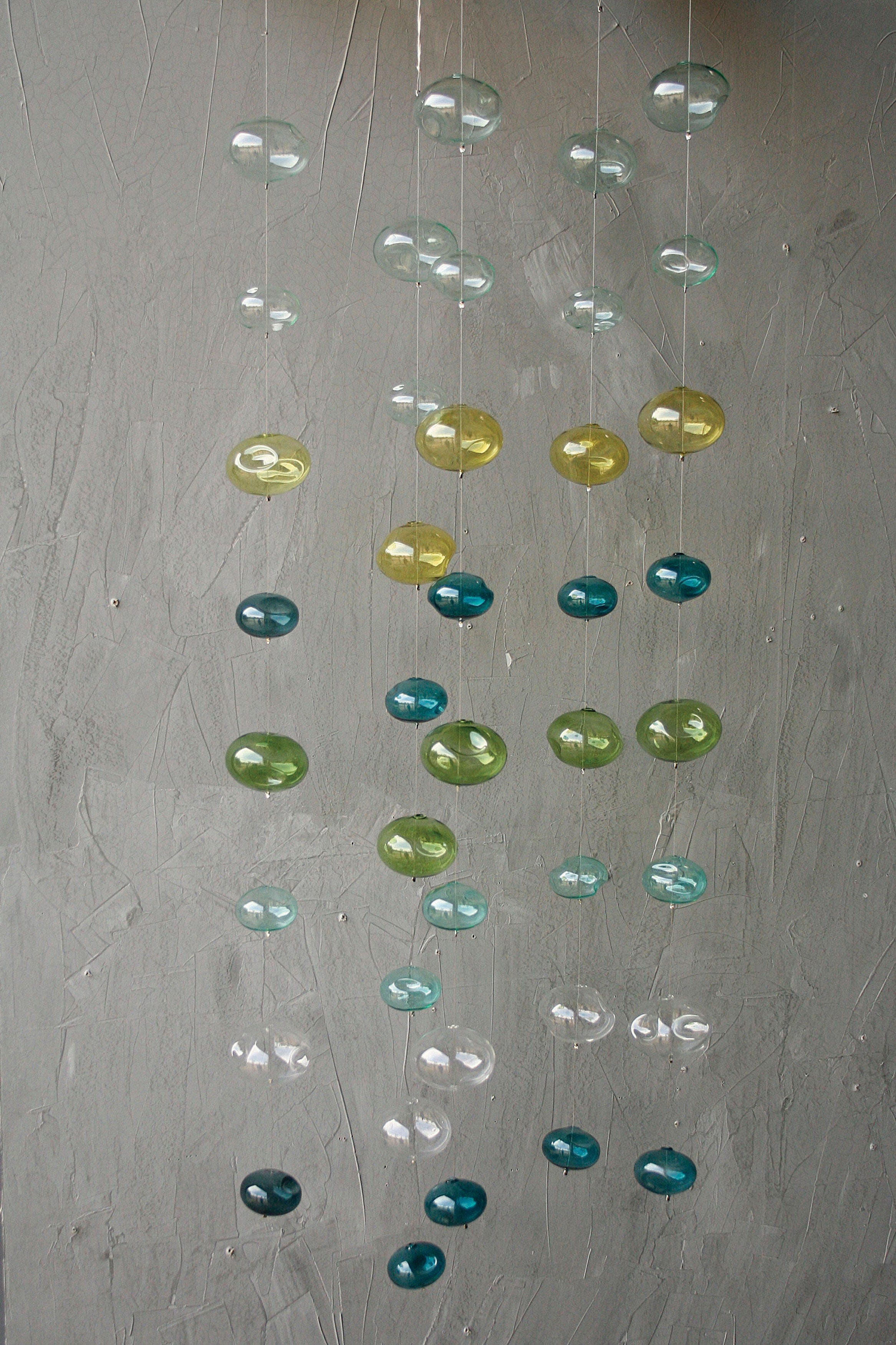 Click here for Storied Home Bubbles Hand-Blown Garland Wall Decor... prices