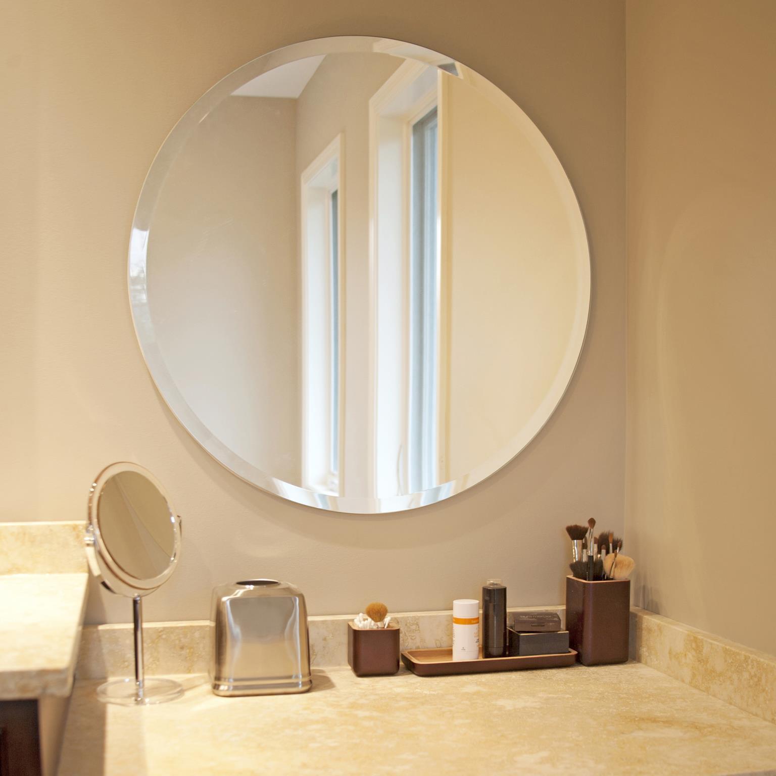 Click here for Howard Elliott Frameless Asymmetrical Mirror prices