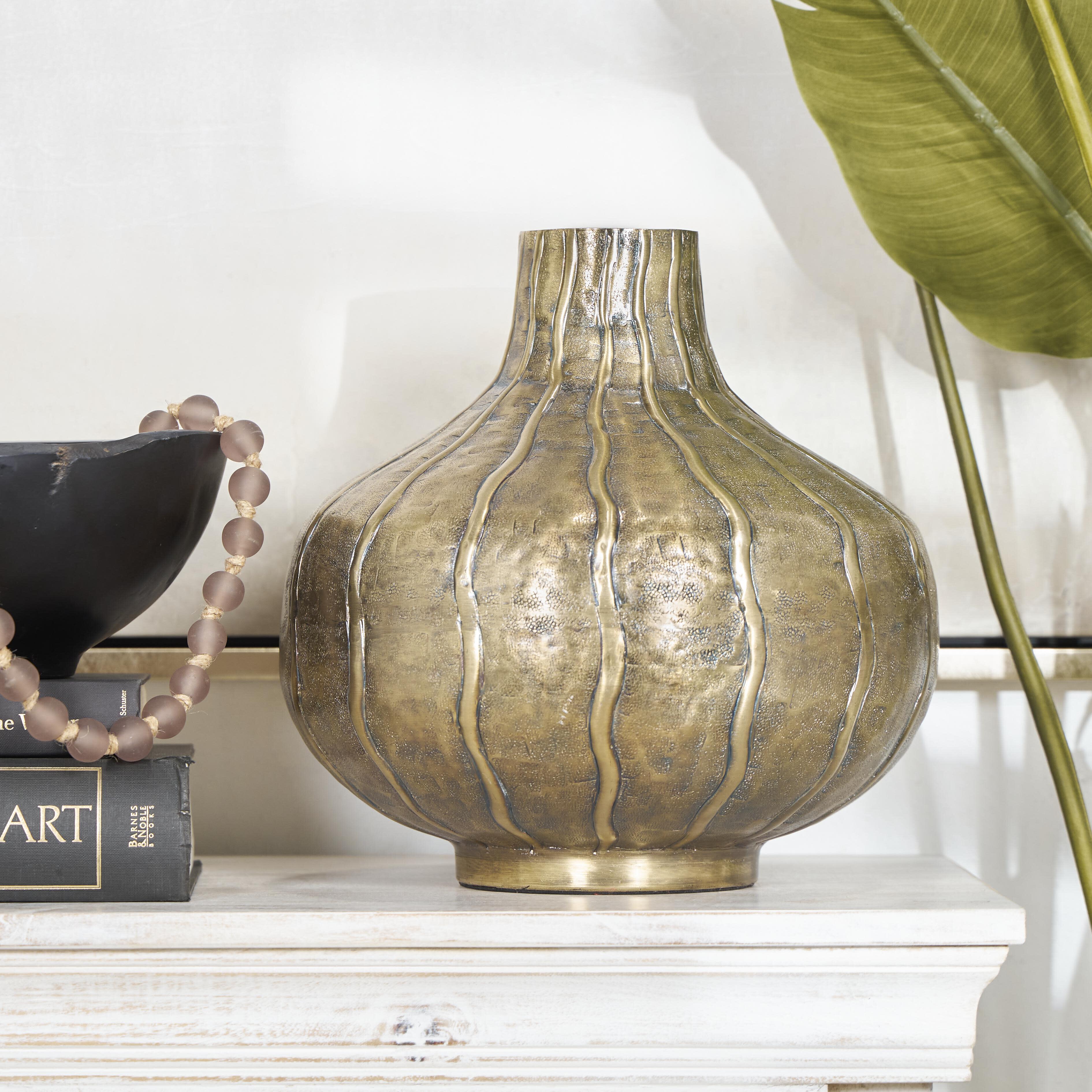 Click here for Bayberry Lane Snakeskin Decorative Vase  Brass prices
