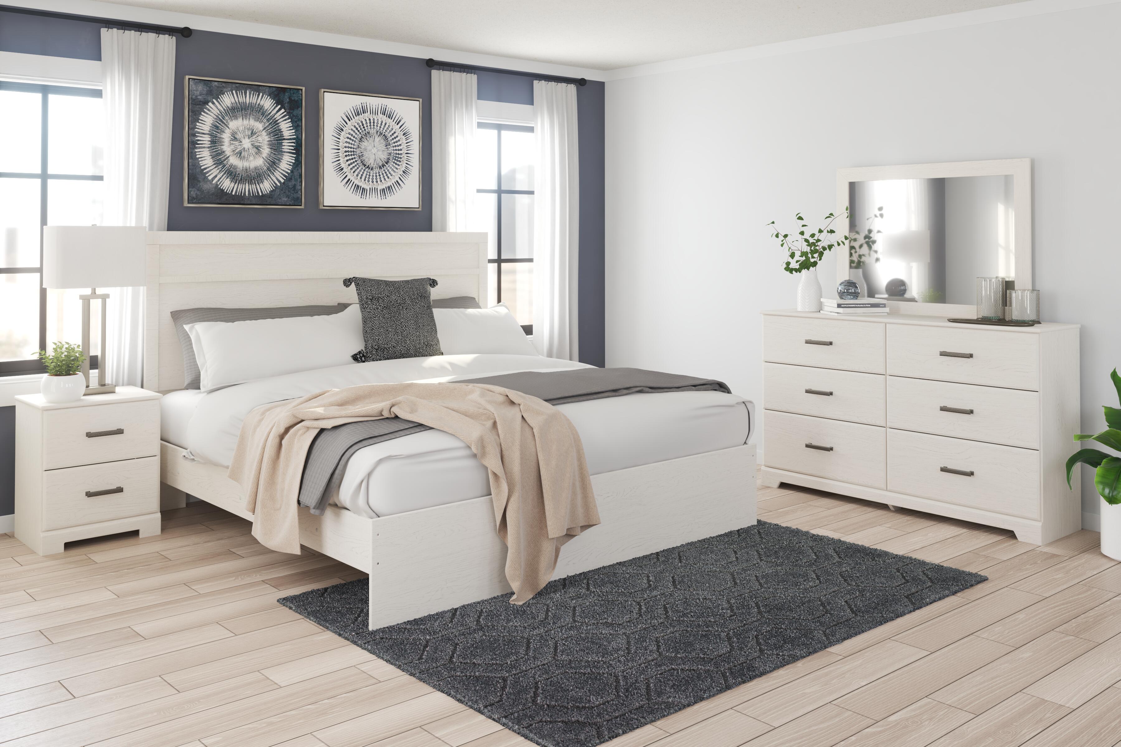 Click here for Stelsie King Panel Bed with Mirrored Dresser and N... prices