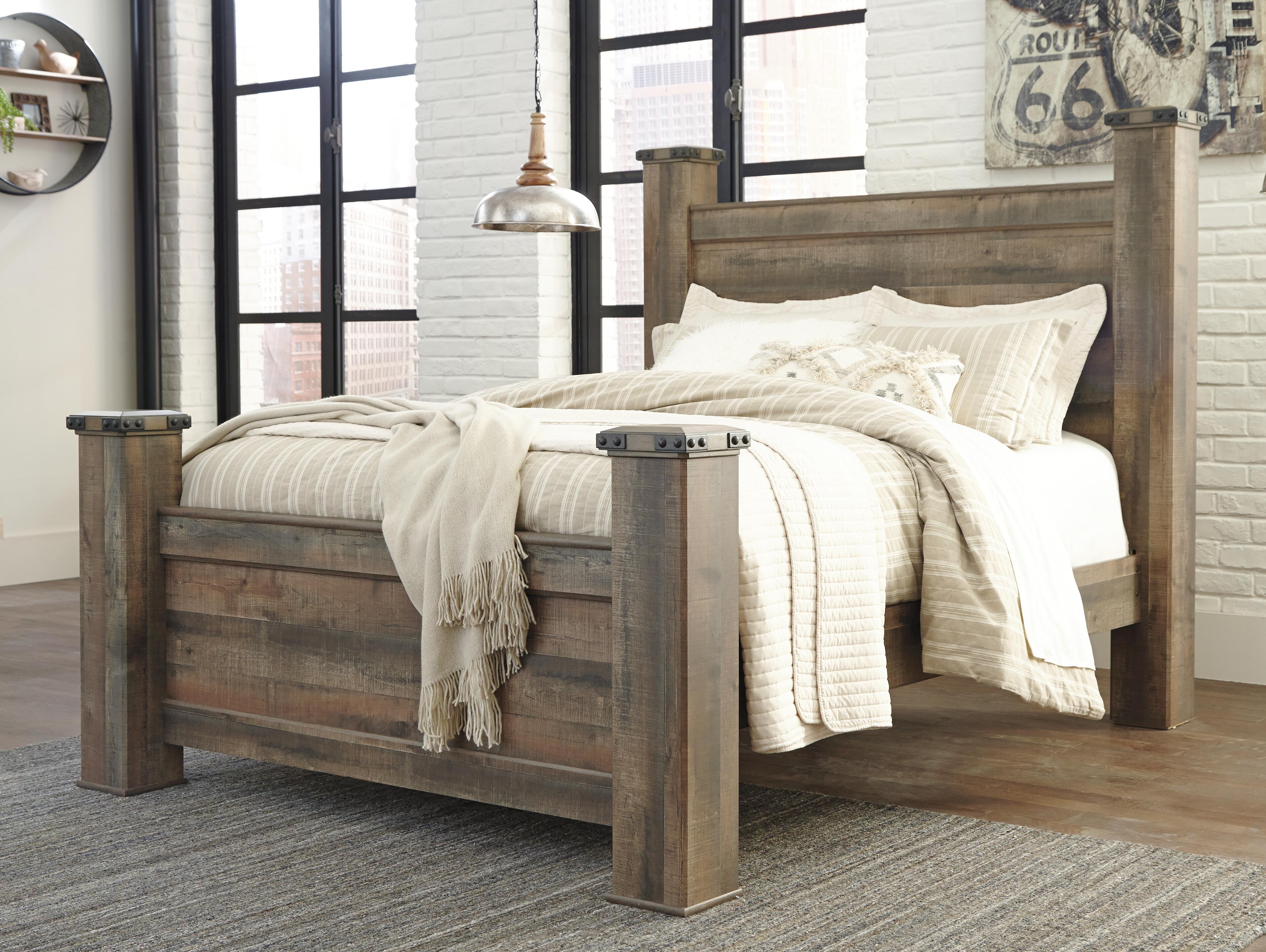 Click here for Trinell Queen Poster Bed  Brown prices