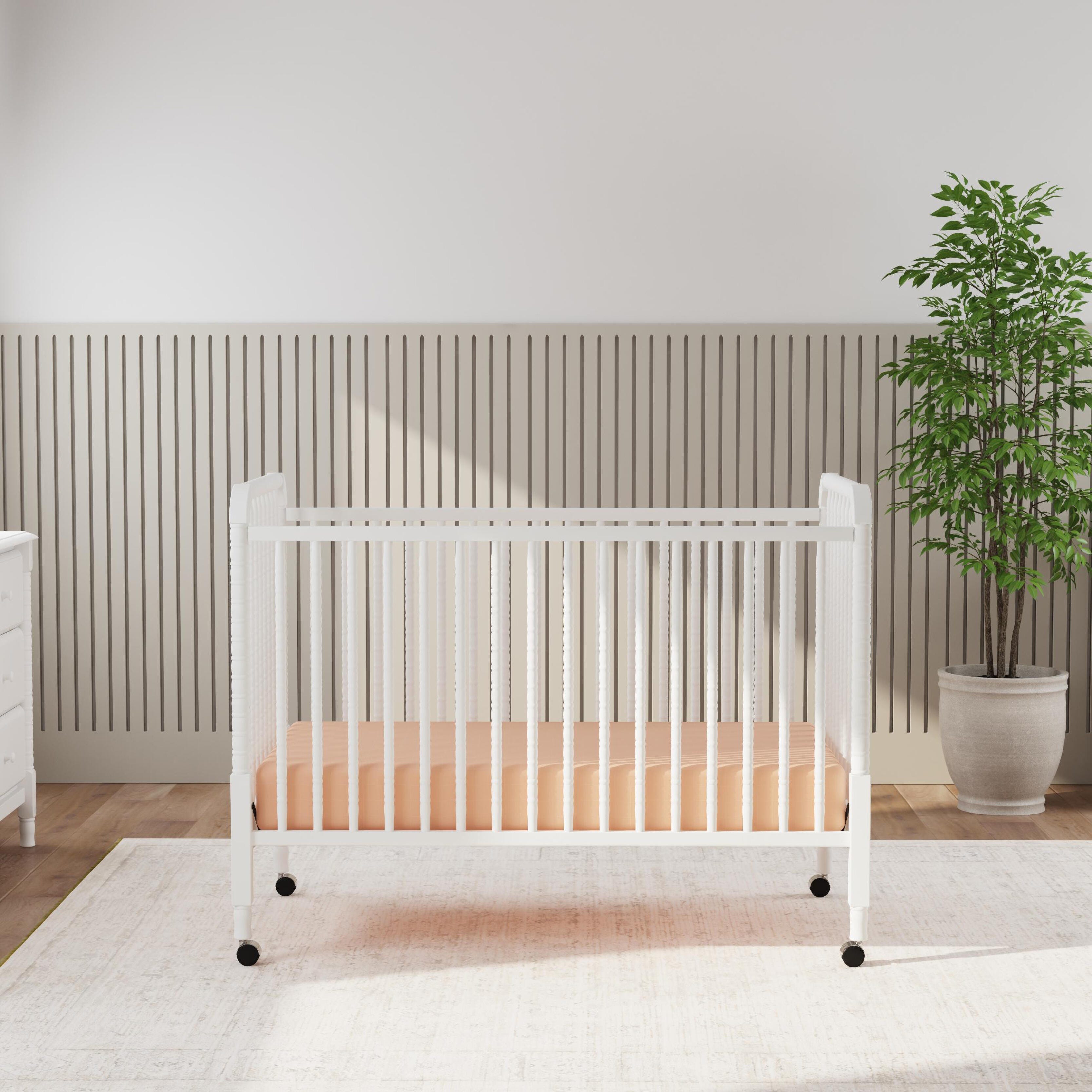 Click here for Davinci Jenny Lind Stationary Crib  White prices