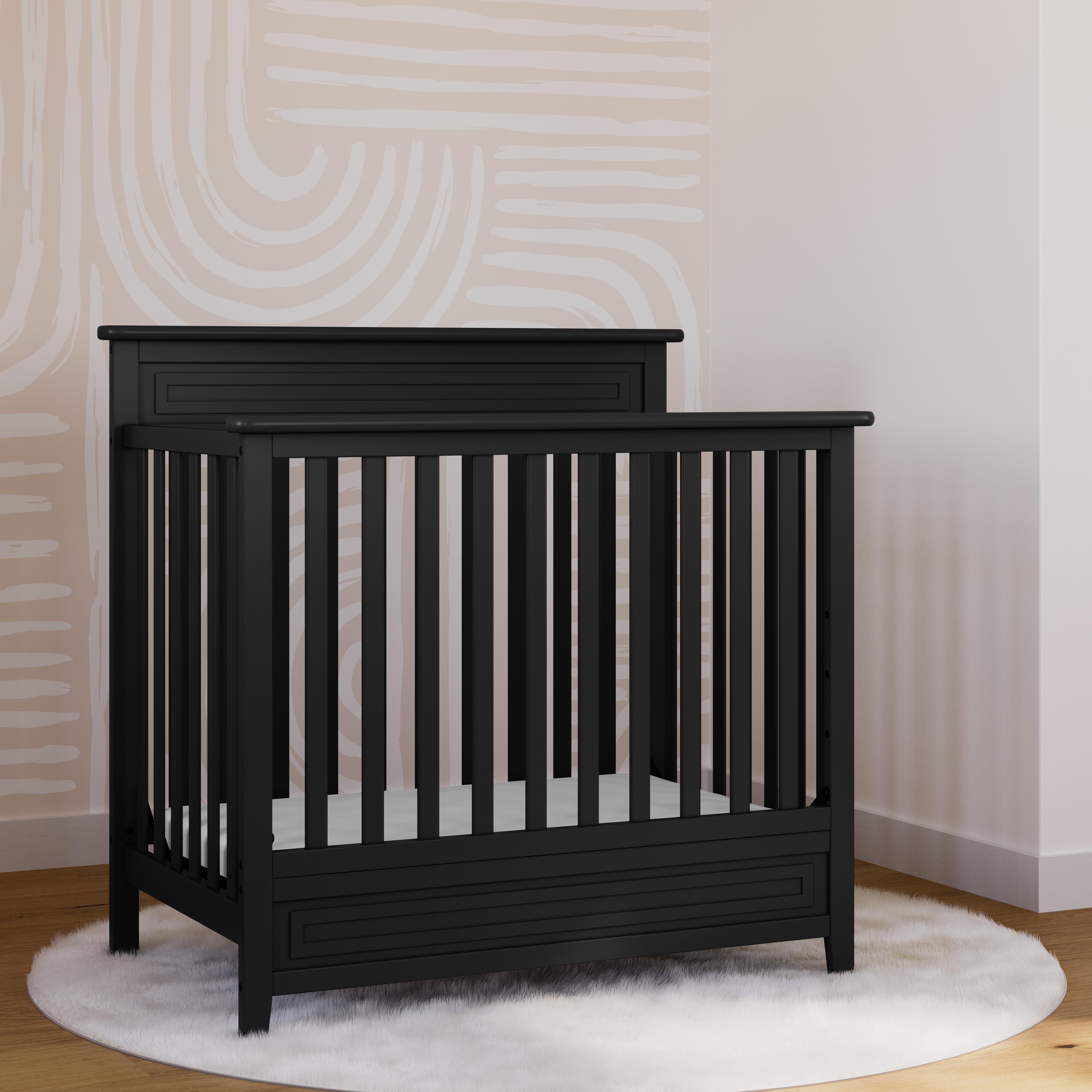 Click here for Storkcraft Petal 4-in-1 Convertible Mini Crib  Bla... prices