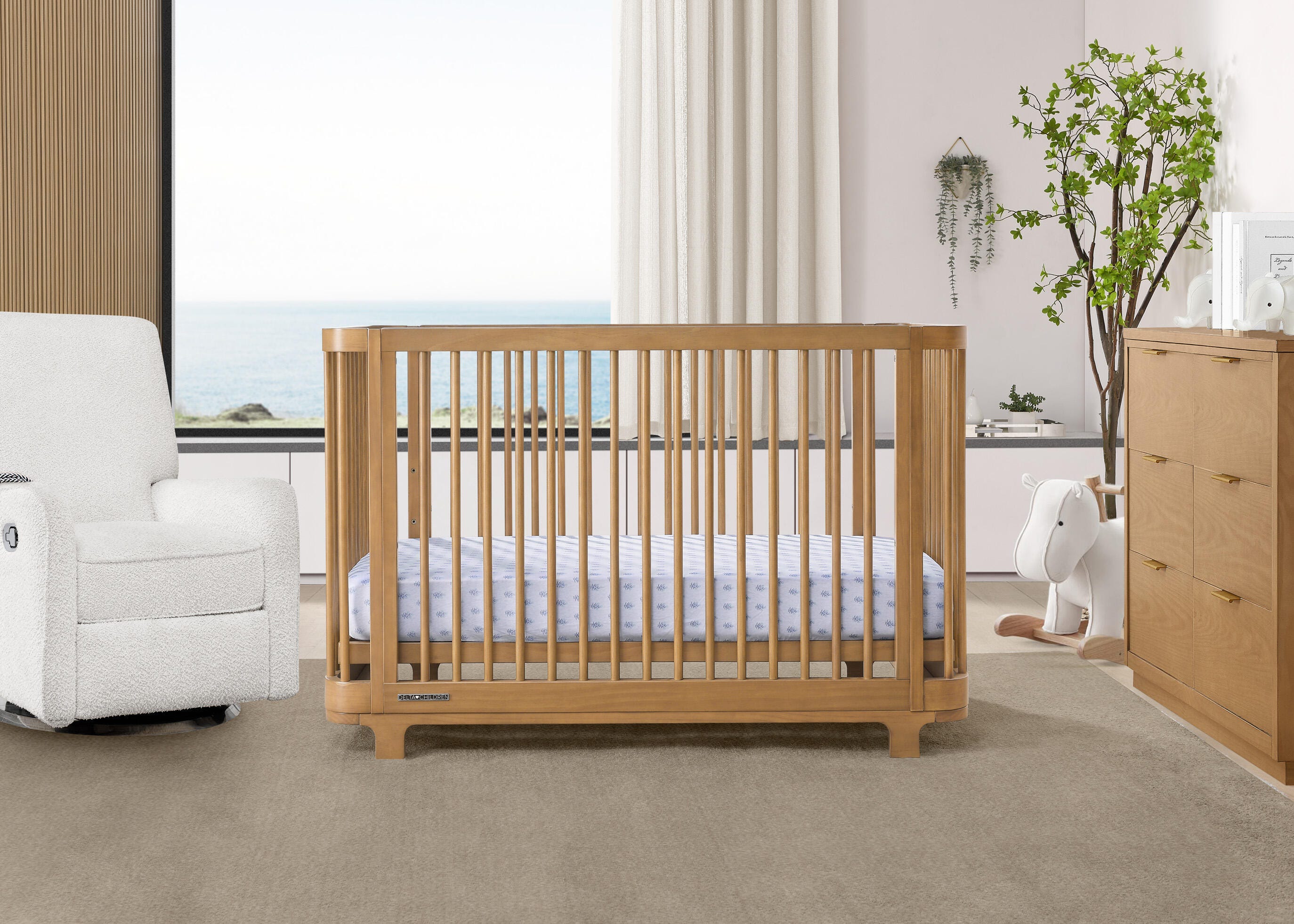 Click here for Delta Children Nest 4-in-1 Convertible Crib  Acorn prices
