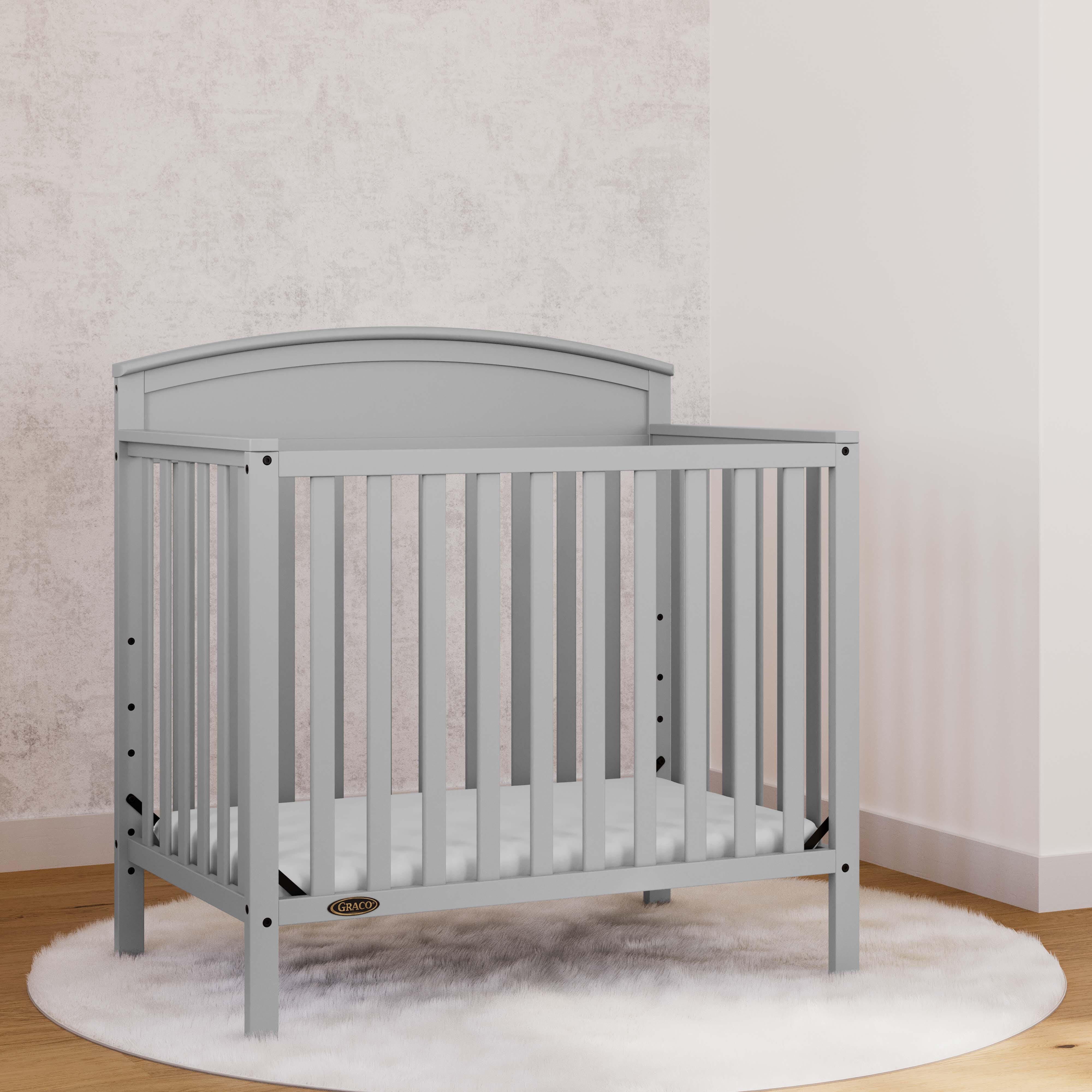 Click here for Graco Benton 4-in-1 Convertible Mini Crib  Pebble... prices