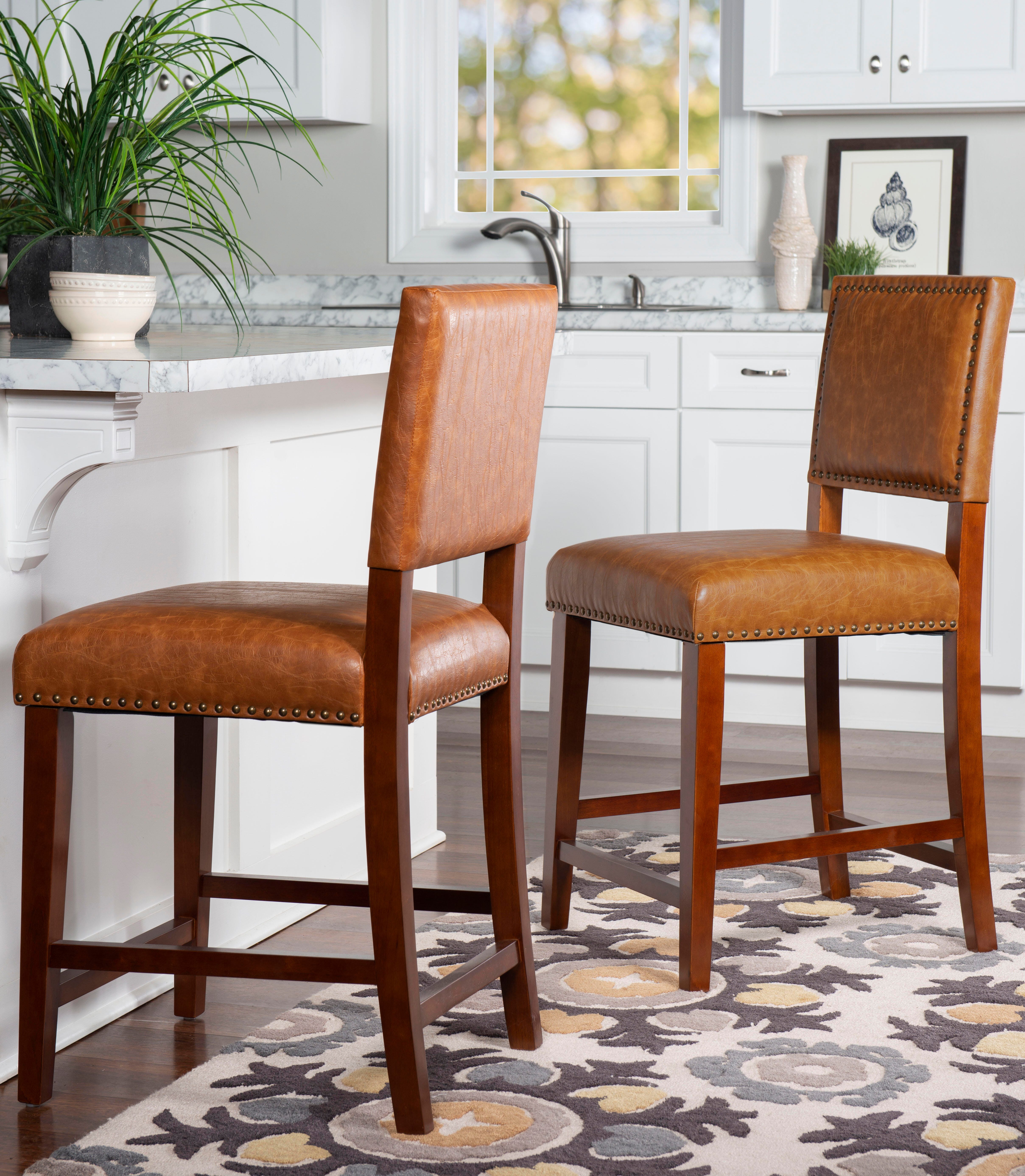 Click here for Robbin Brook Counter Height Bar Stool  Brown prices