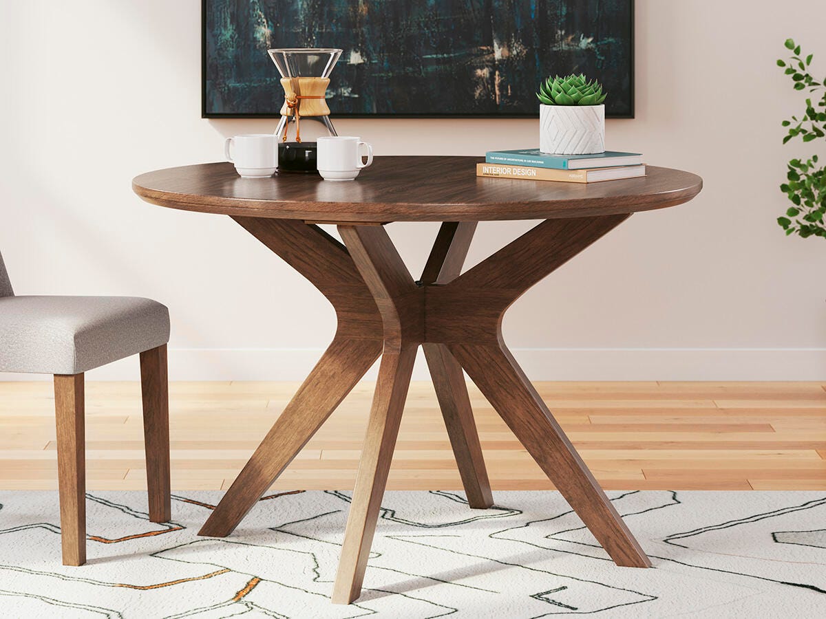 Click here for Lyncott Round Dining Table  Brown  Wood prices