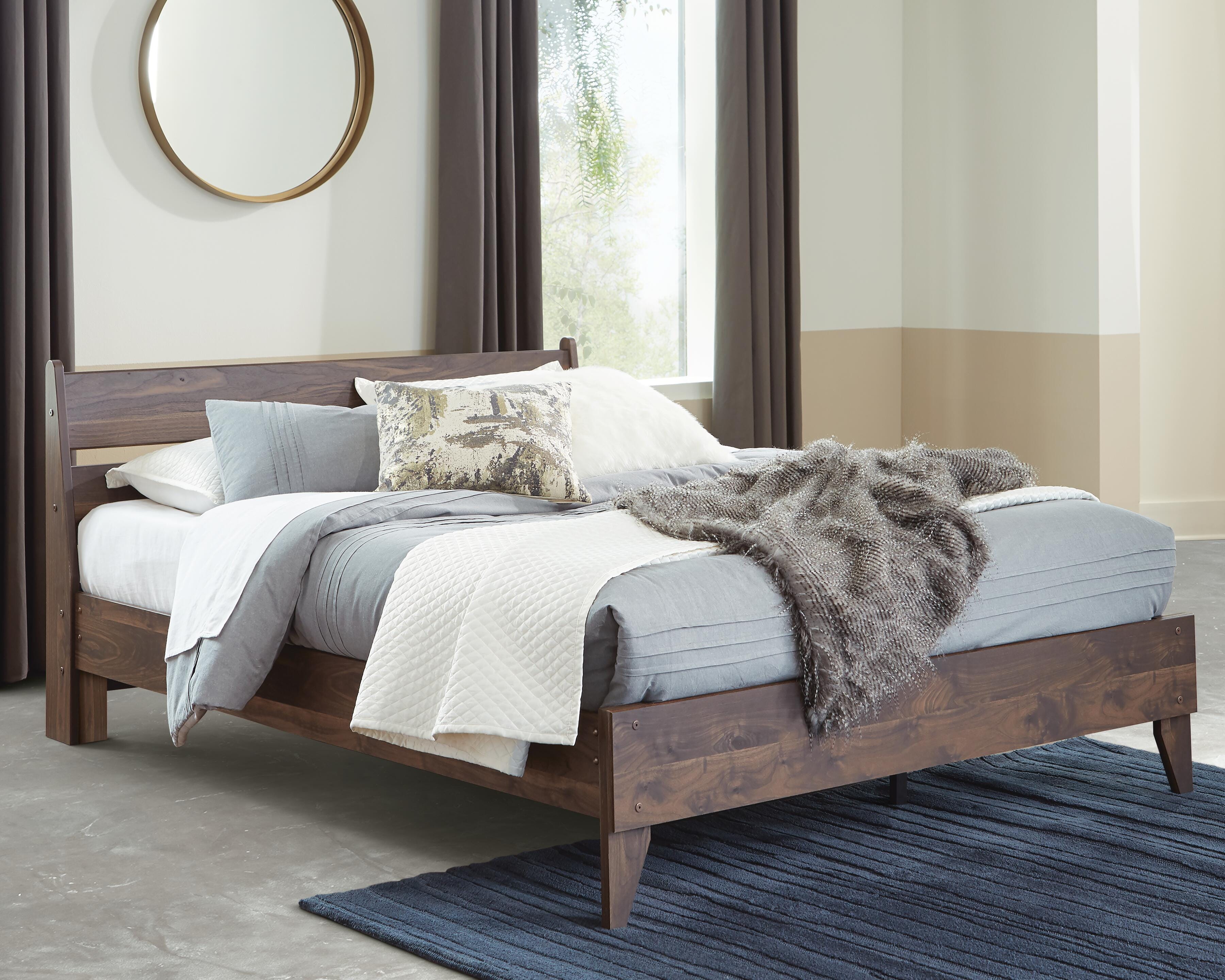 Click here for Calverson Queen Panel Platform Bed  Mocha prices