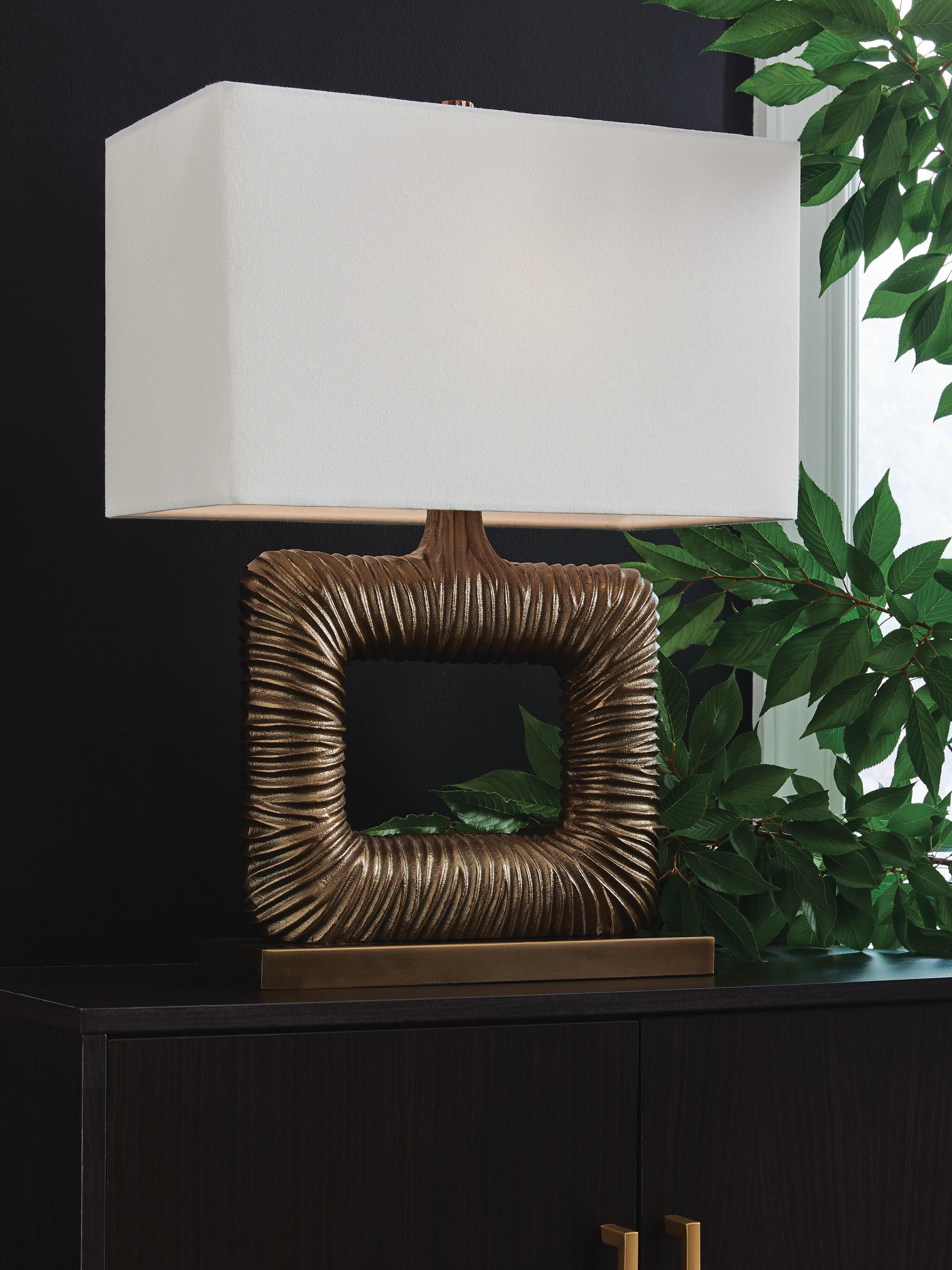 Click here for Garronby Table Lamp  Antique Brass Finish prices