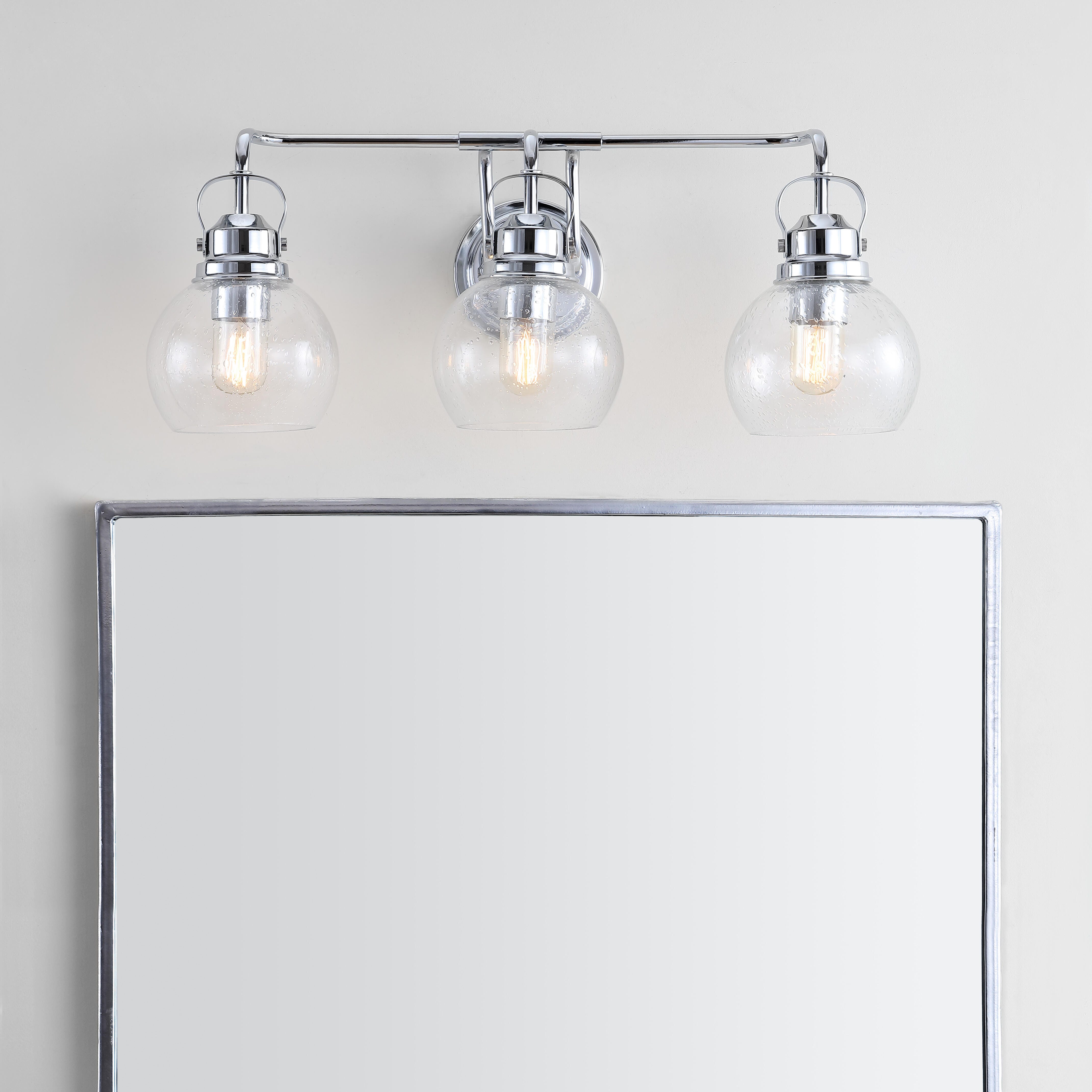 Click here for Jonathan Y 3-Light Round Sconce  Chrome/Clear prices