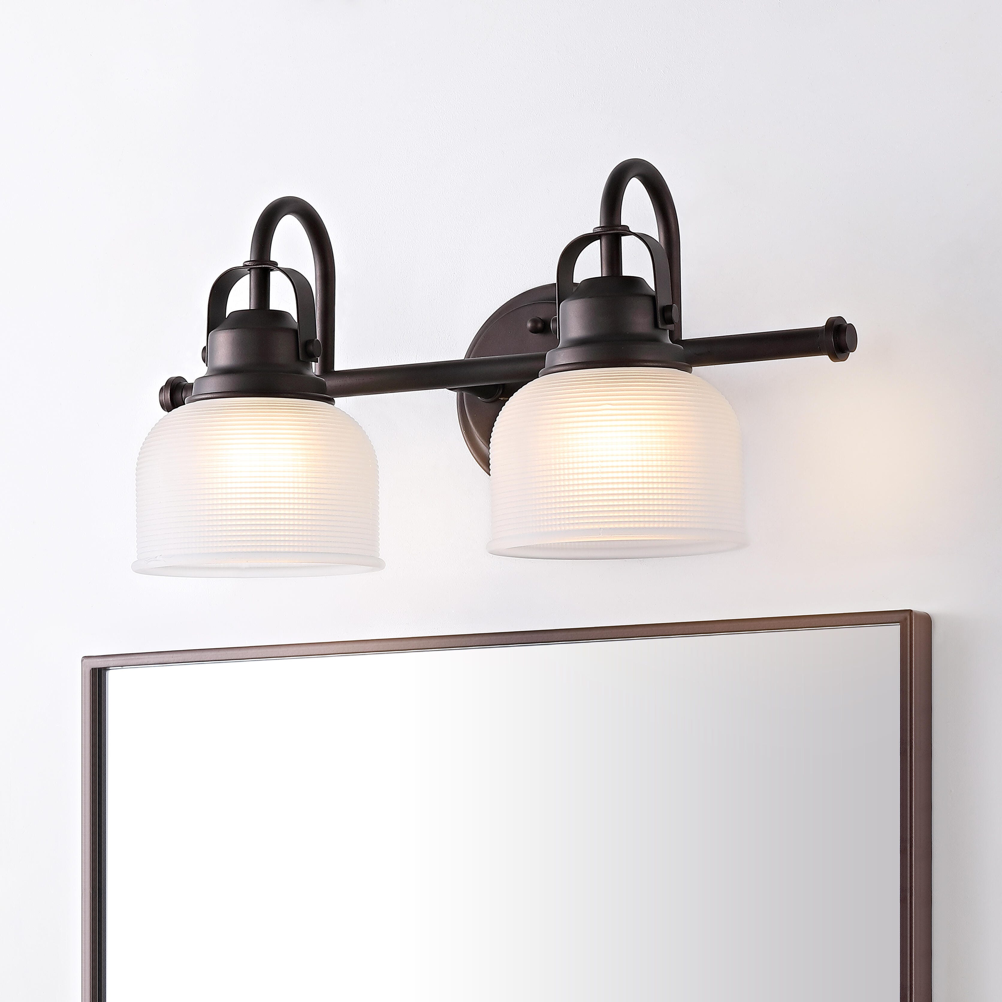 Click here for Jonathan Y 2-Light Round Sconce  Rubbed Bronze prices