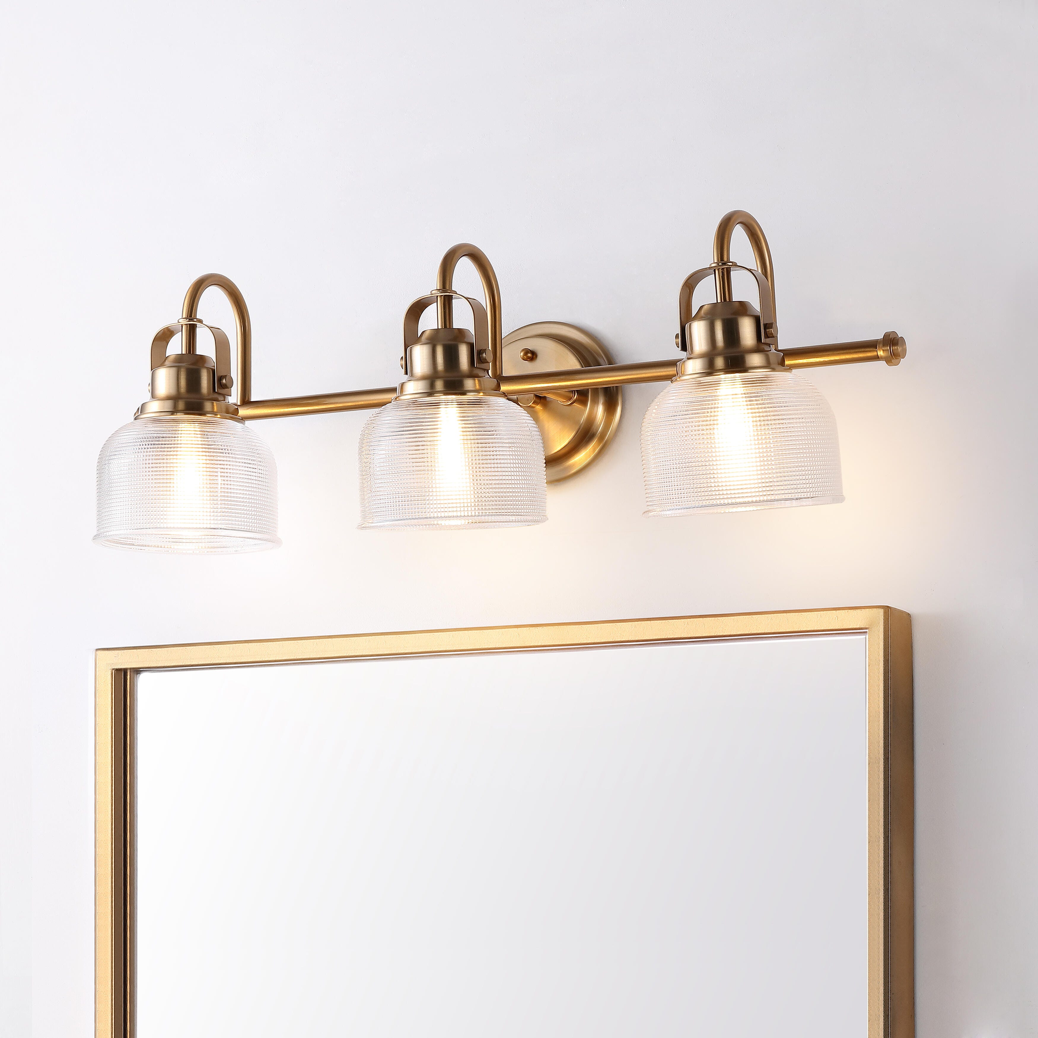 Click here for Jonathan Y 3-Light Sconce  Brass/Gold prices