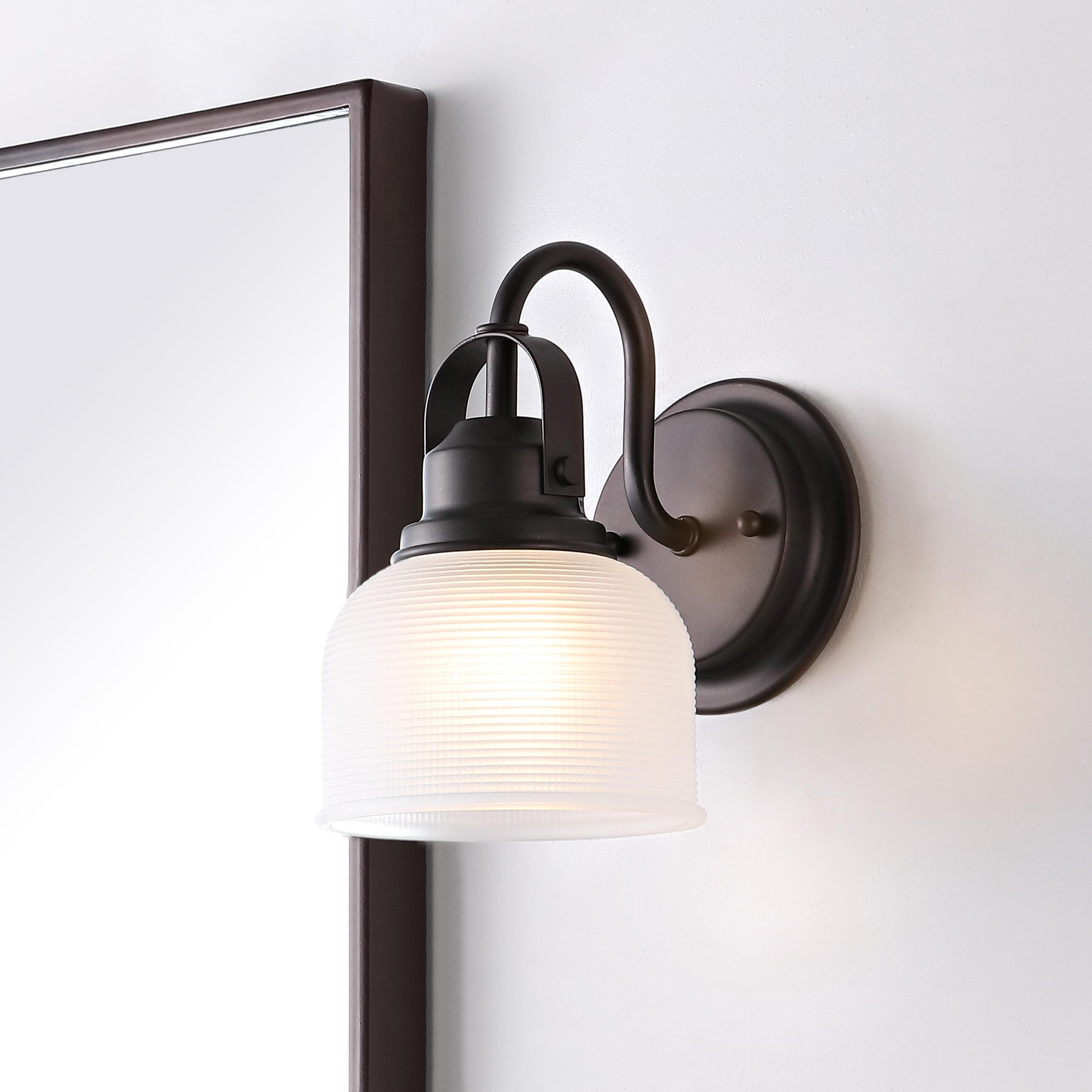 Click here for Jonathan Y 1-Light Round Sconce  Bronze prices