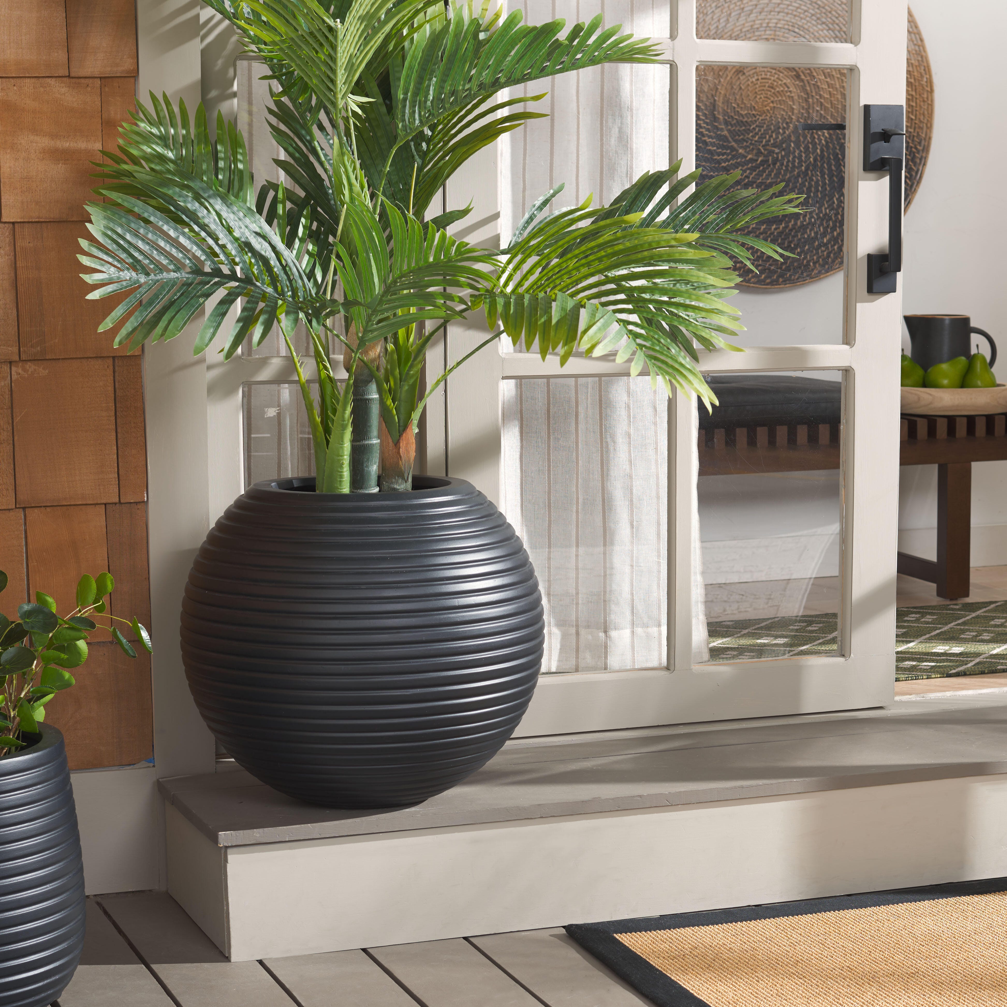 Click here for Safavieh Mora Outdoor Planter  Black prices