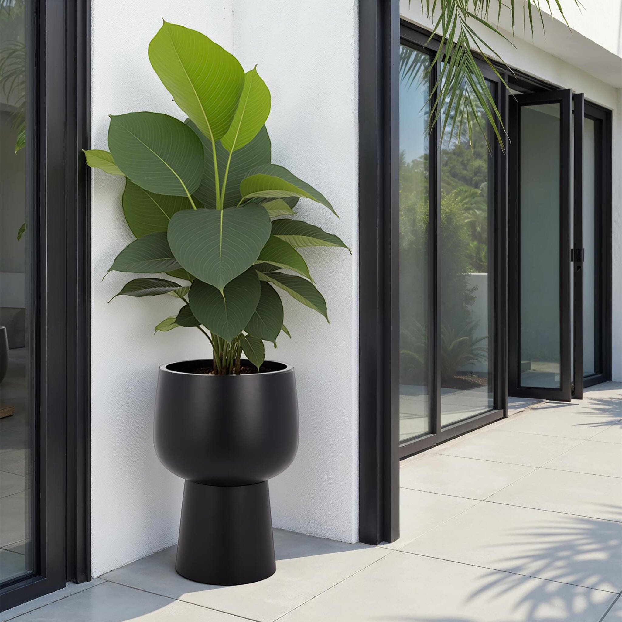 Click here for Safavieh Olivia Outdoor Planter  Black prices