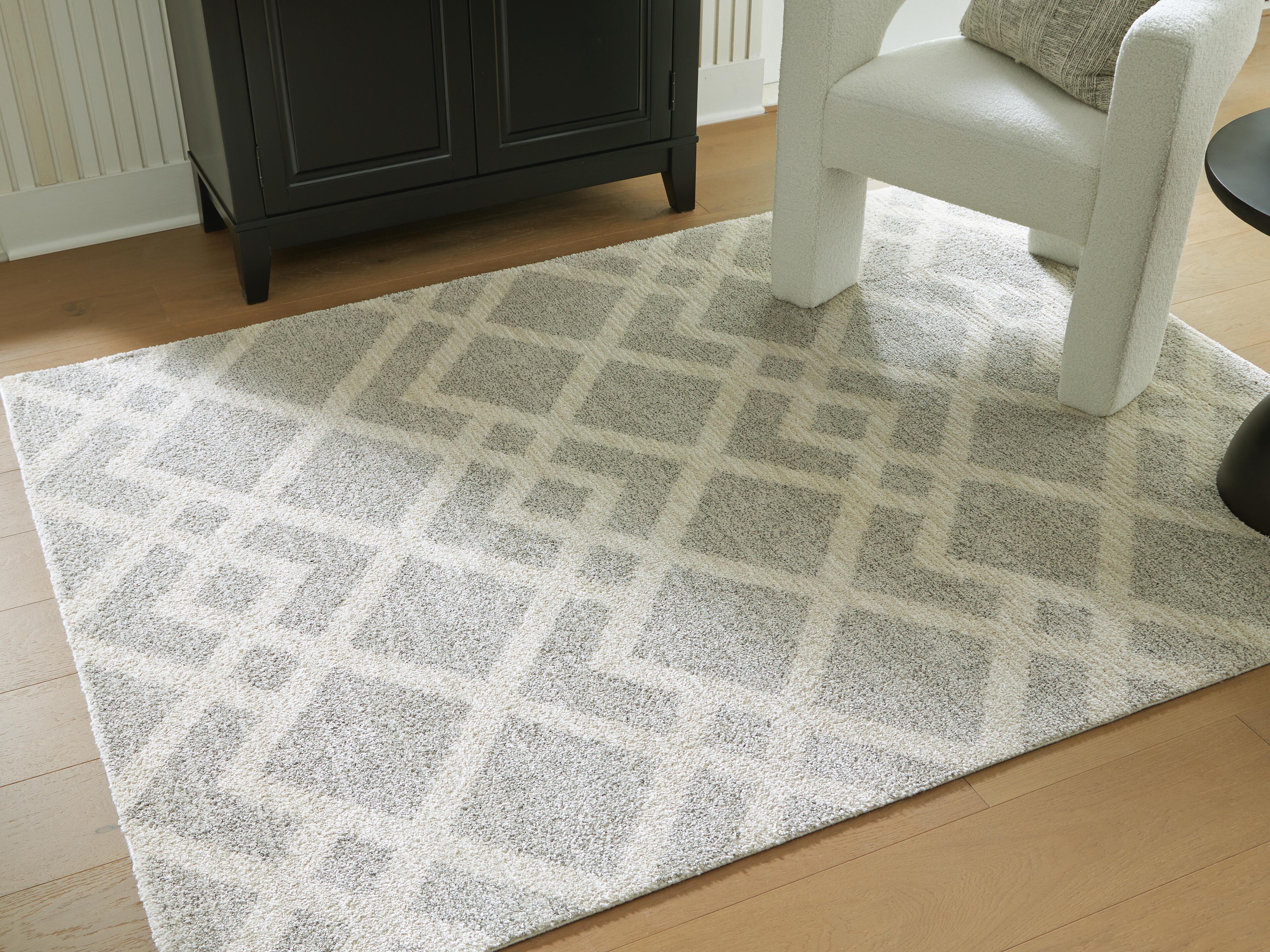 Click here for Unawick Medium Rug  Gray/Ivory prices