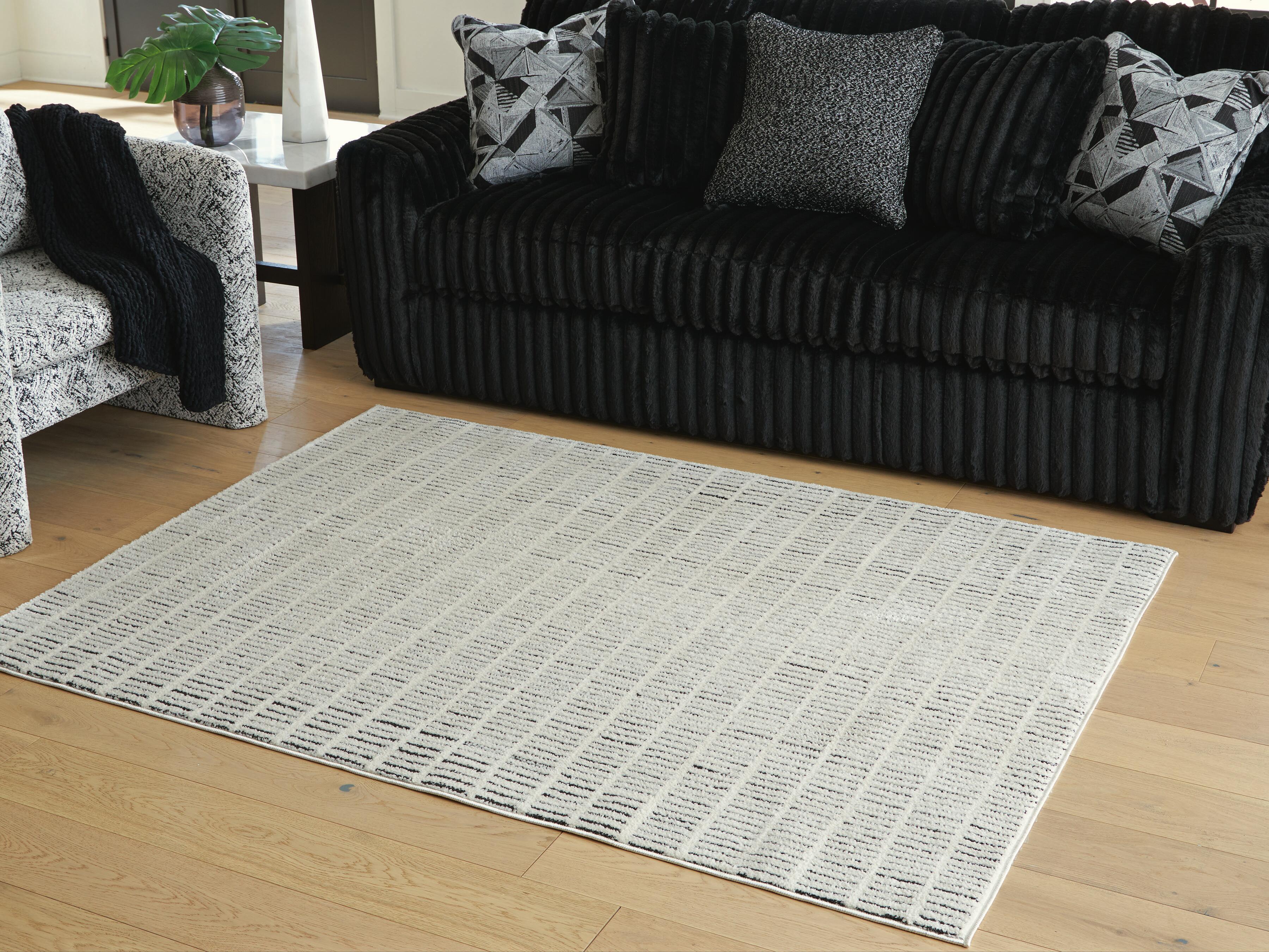 Click here for Turinwith 53 x 7 Area Rug  Ivory/Black prices