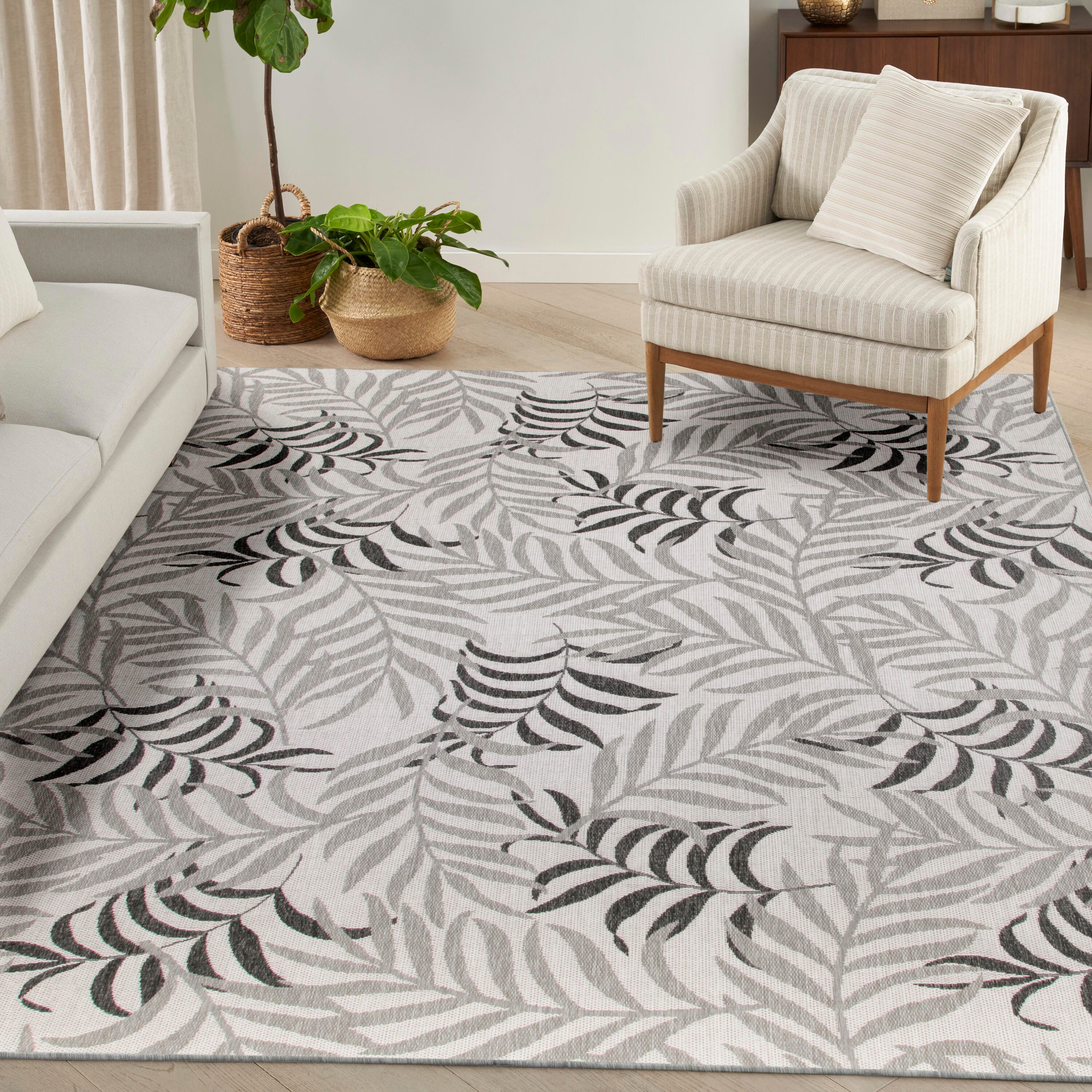 Click here for Nourison Home Tropical 9 x 12 Area Rug  Gray prices