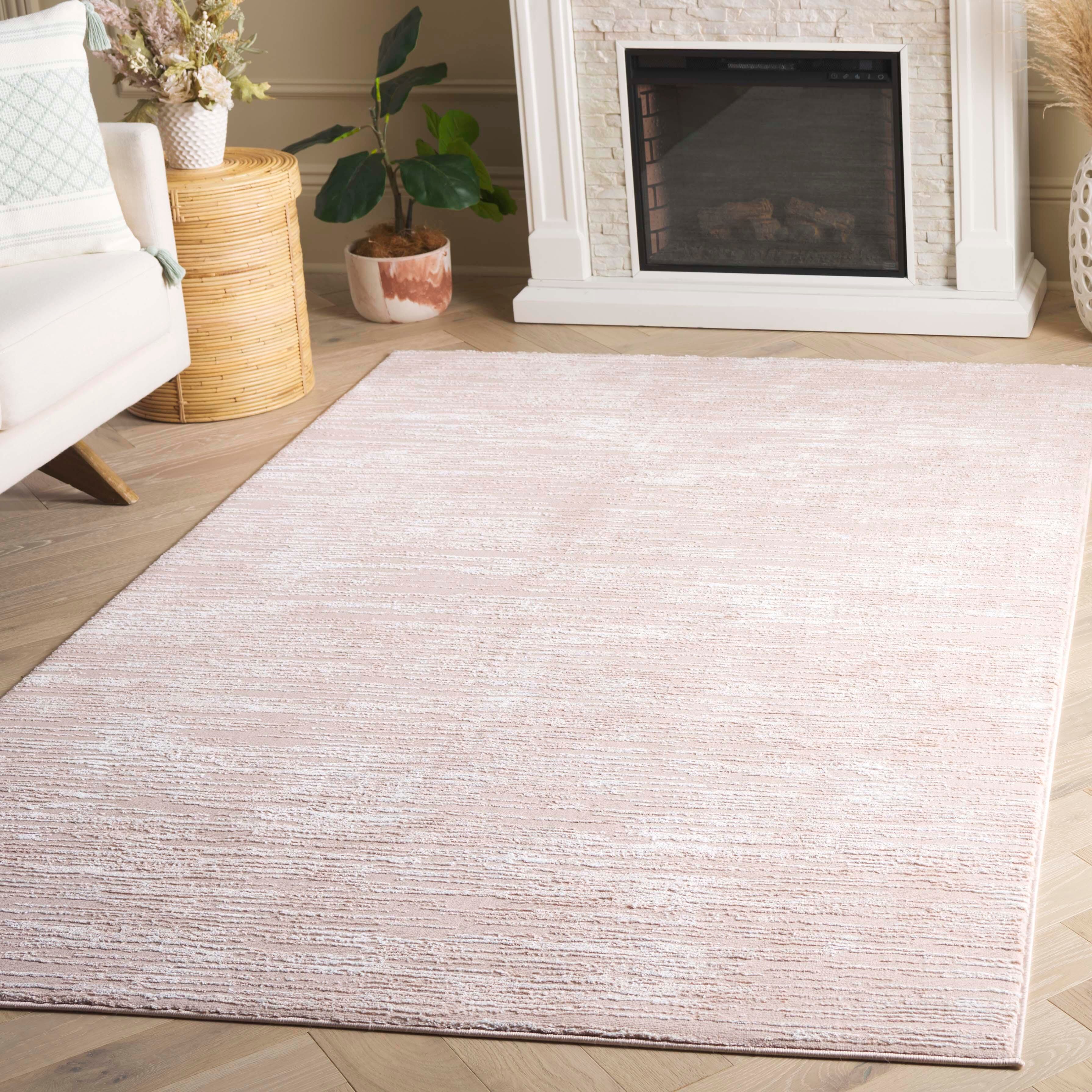 Click here for Safavieh Revive Judy 2 7 x 5 Area Rug  Pink/Ivory prices
