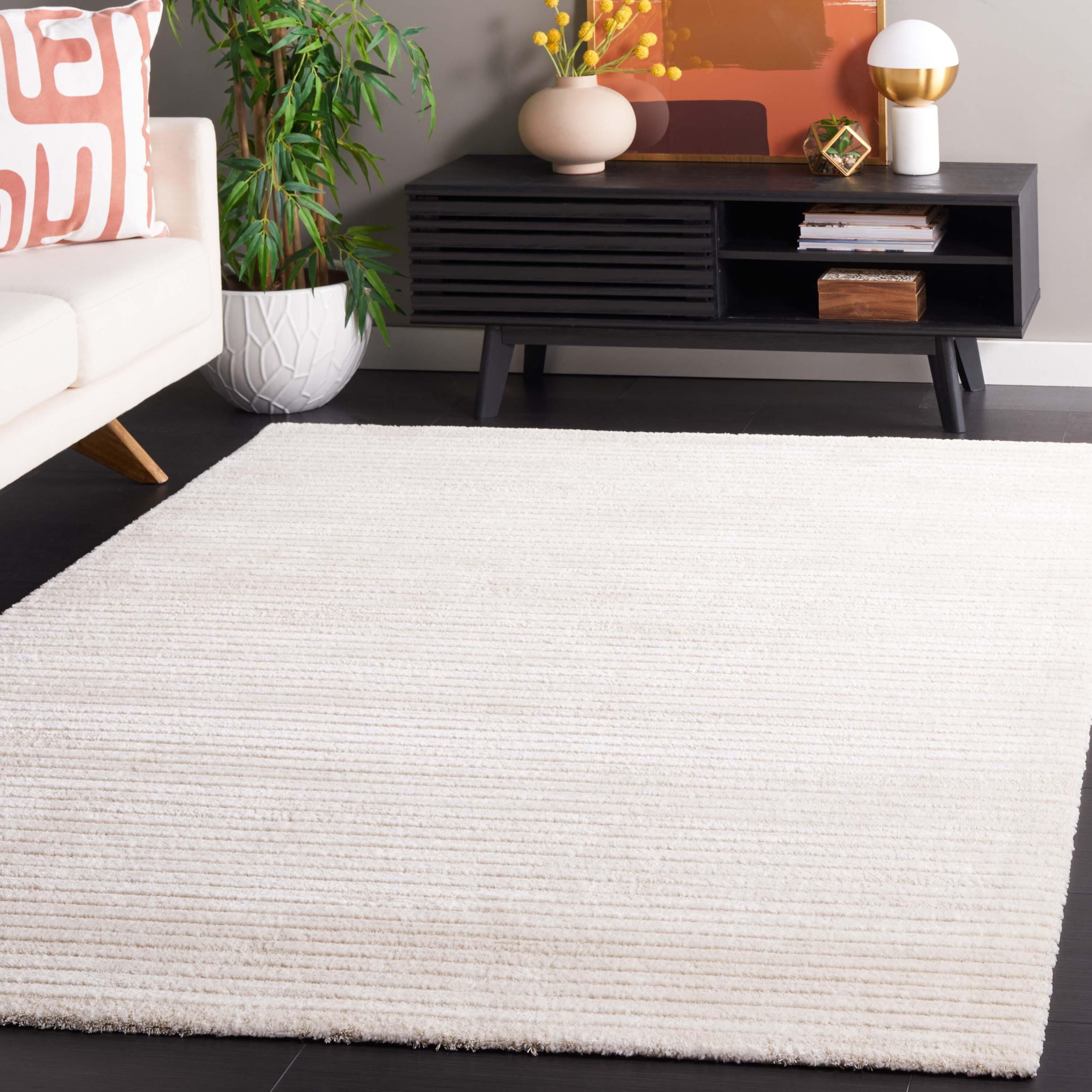 Click here for Safavieh Neptune Hanneke 5 3 x 7 6 Area Rug  Ivory... prices