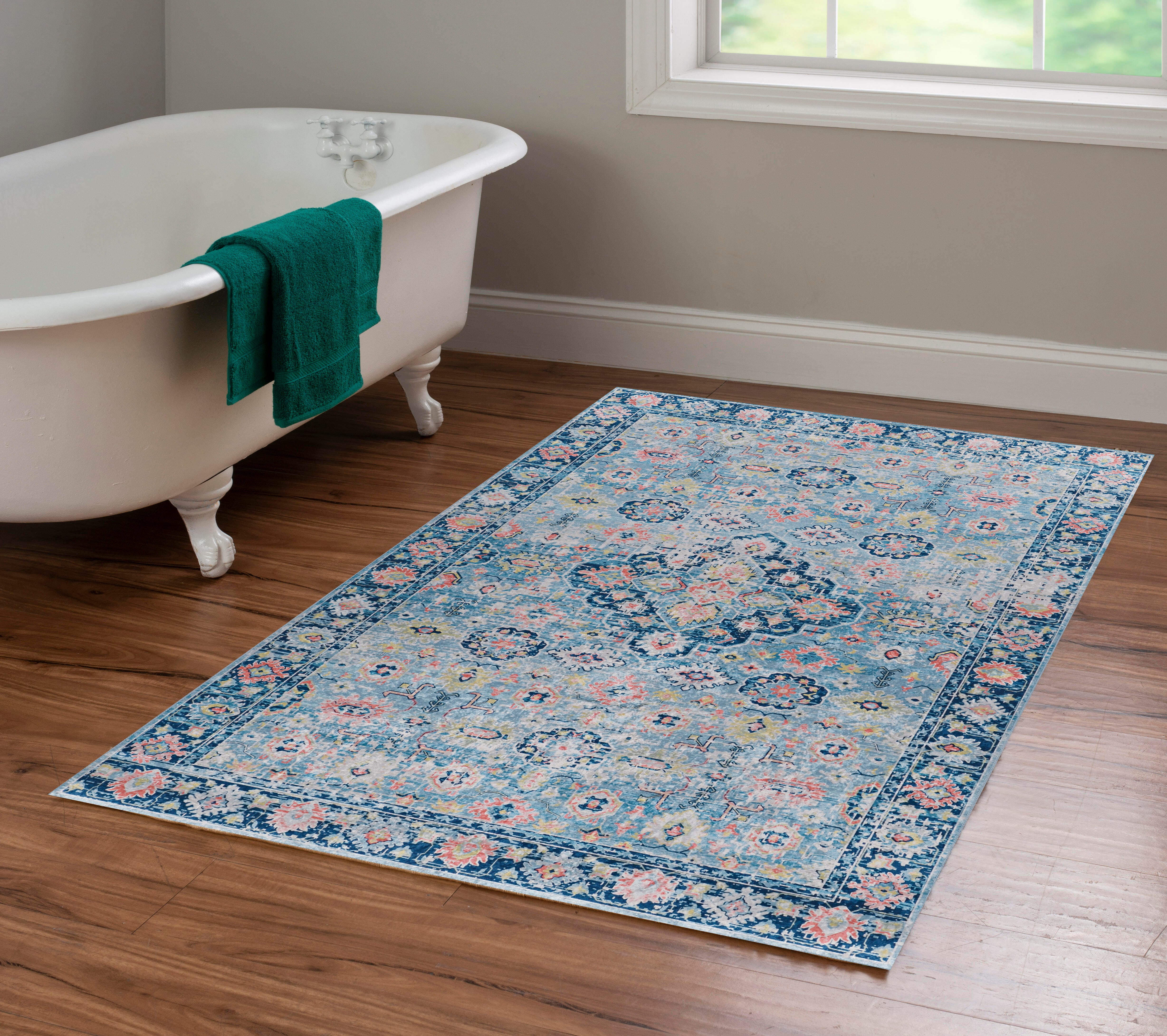 Click here for Linon Emerald Canton 33 x 5 Area Rug  Blue prices