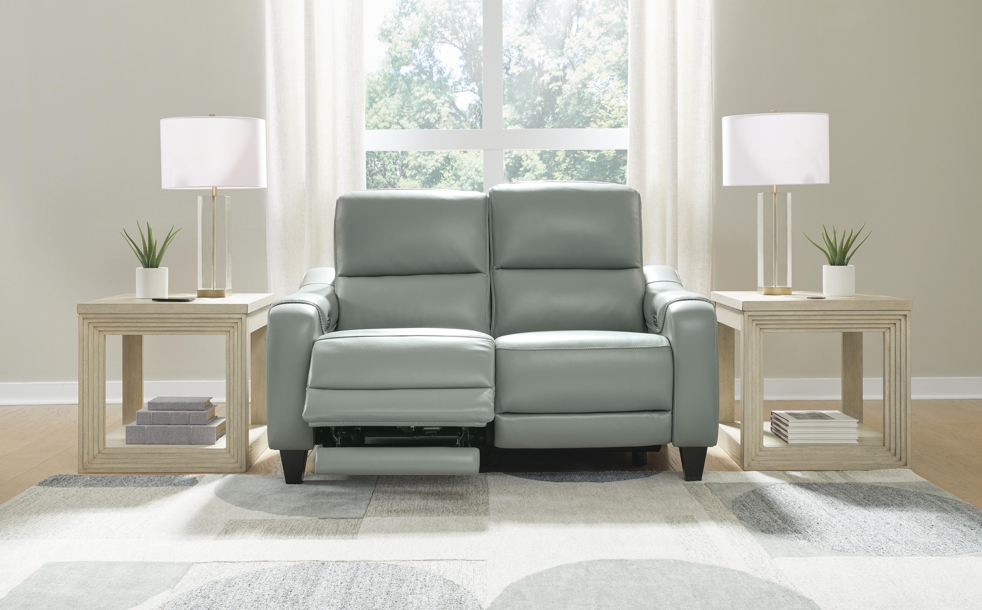 Click here for Mosswell Dual Power Leather Reclining Loveseat Lea... prices