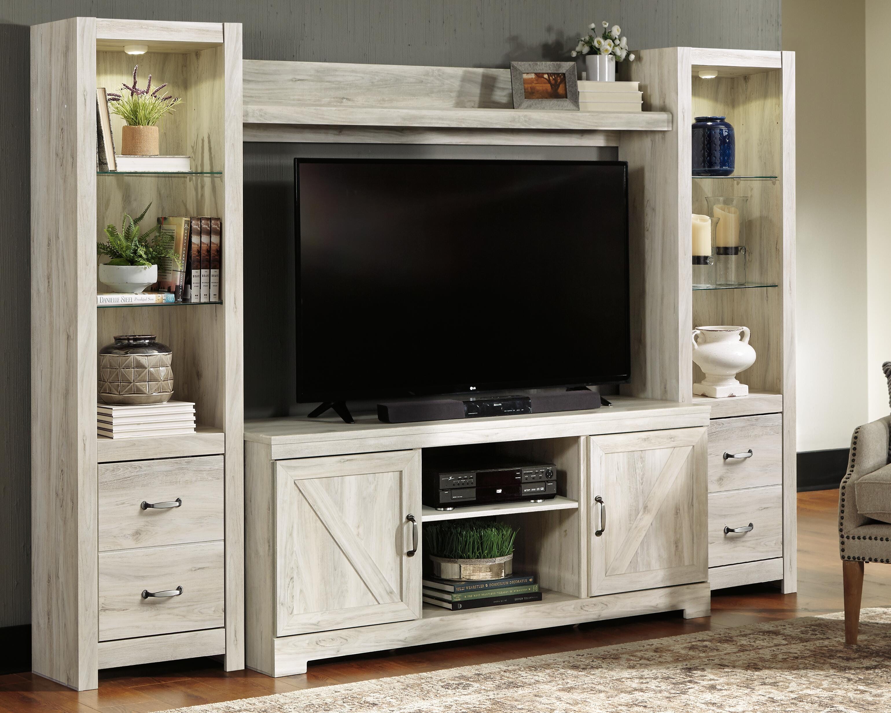 Click here for Bellaby 4-Piece Entertainment Center with 63 TV St... prices
