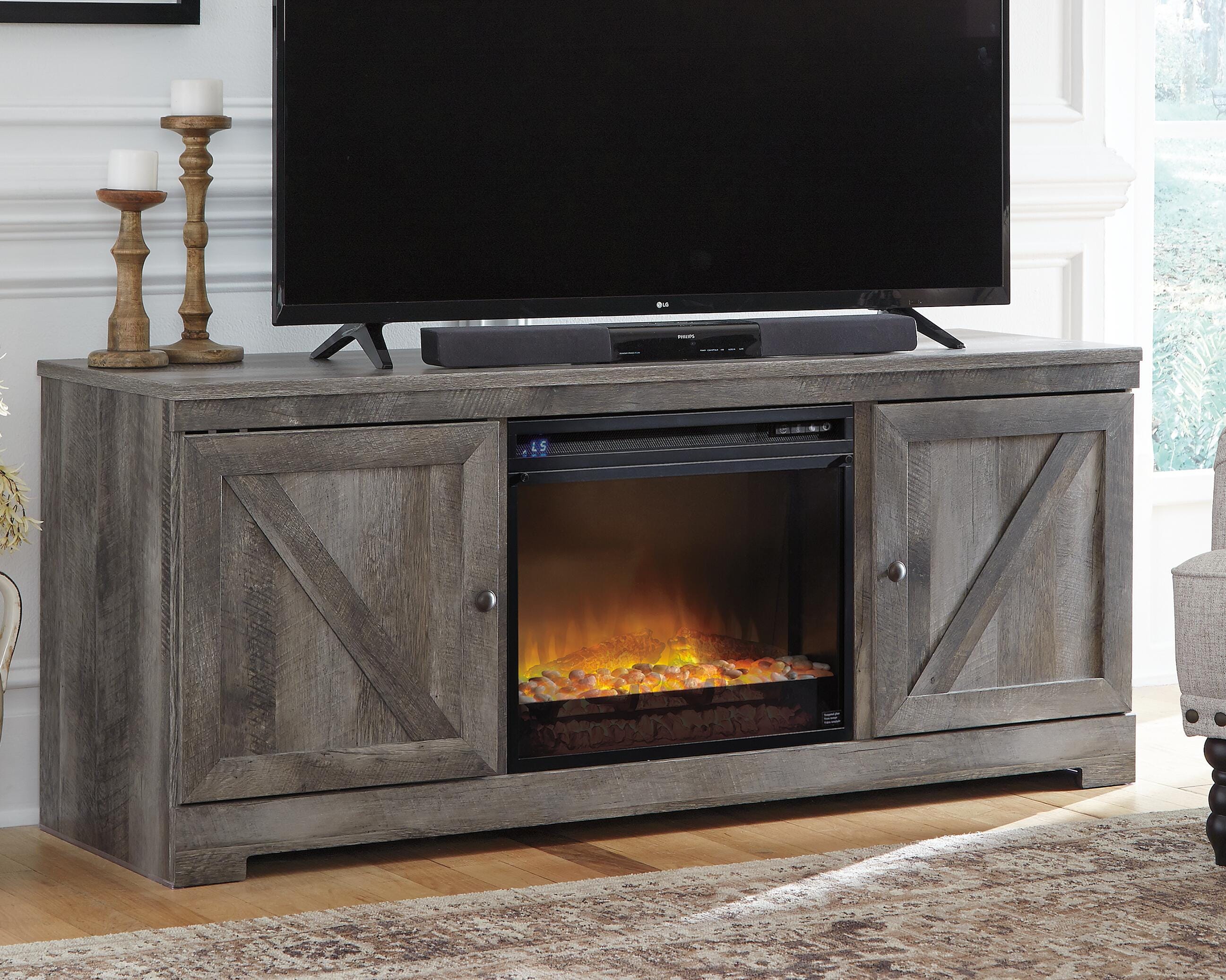 Click here for Wynnlow 63 TV Stand with Electric Fireplace for Mi... prices